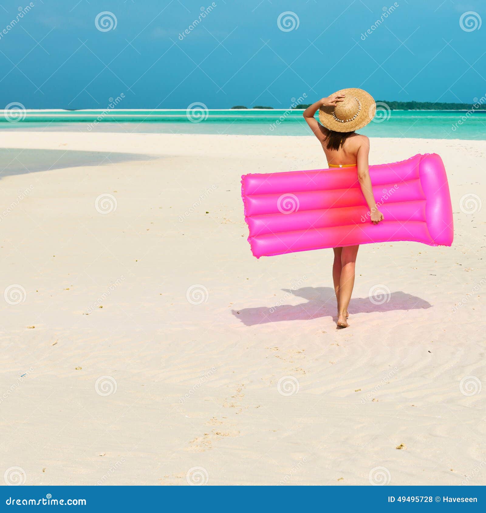 Woman with Pink Inflatable Raft at the Beach Stock Photo - Image of ...