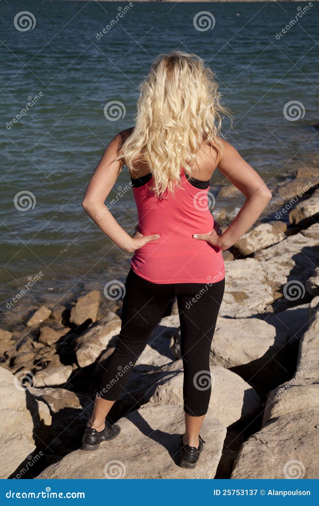 Woman pink tank back water stock image. Image of lake - 25753137