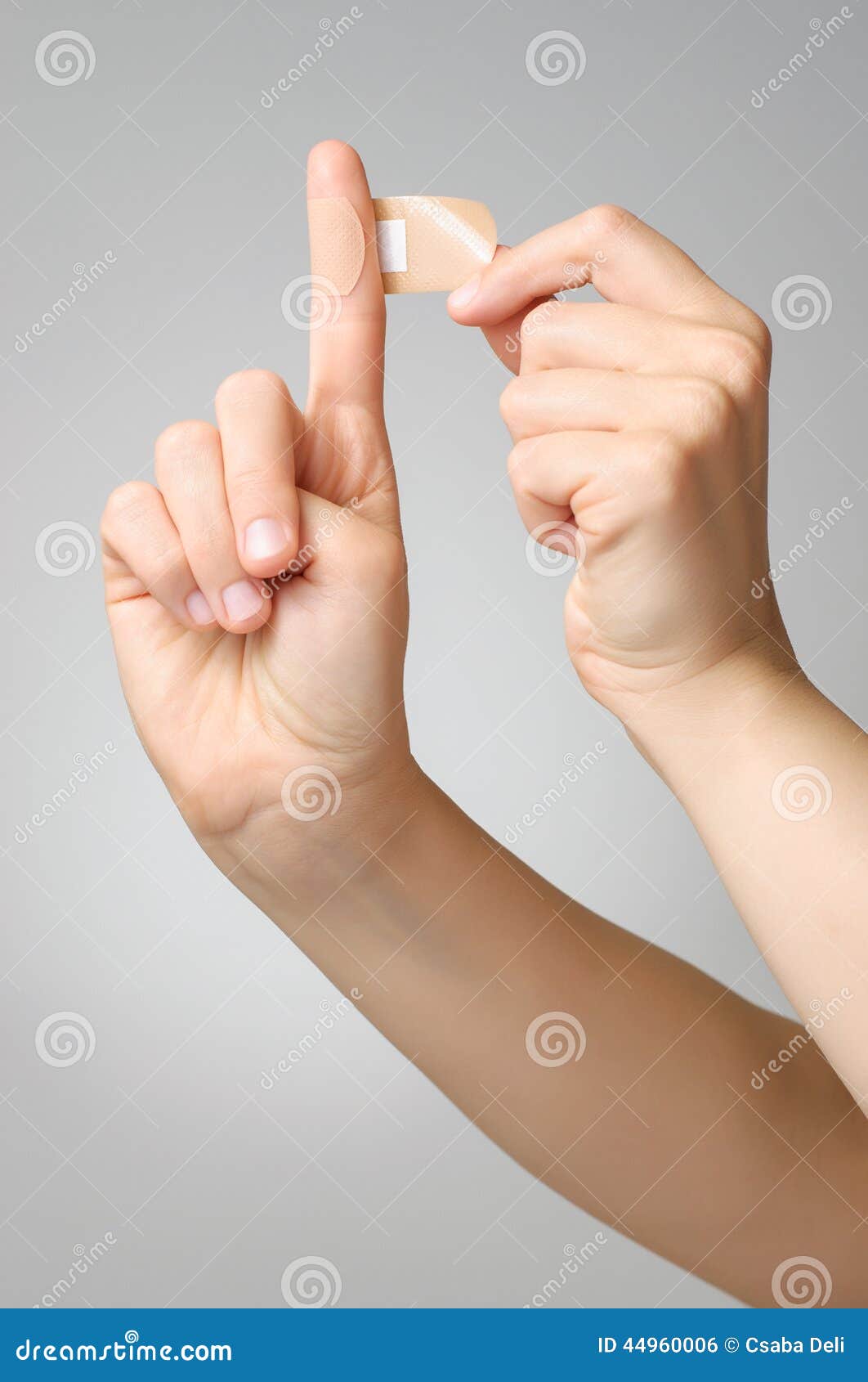 Woman with a Plaster on Her Finger Stock Photo - Image of bandaged ...