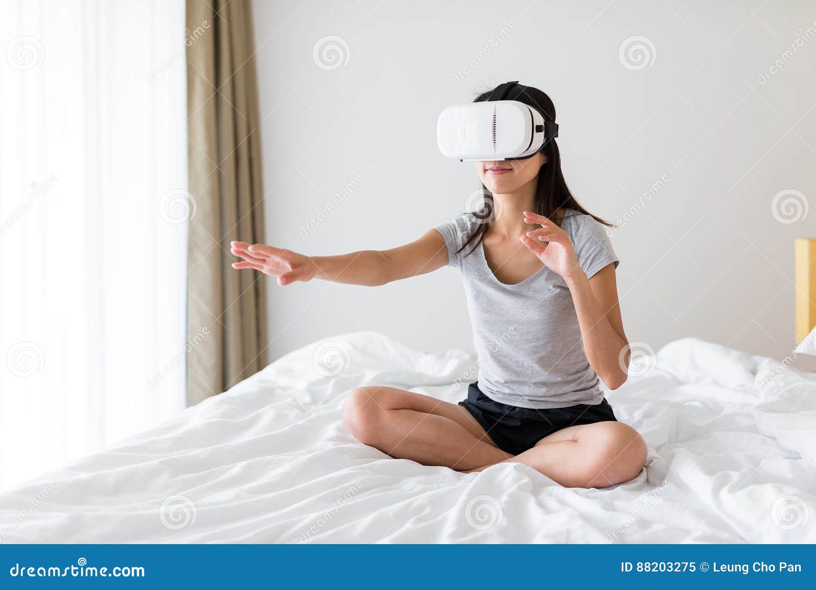 Woman Play with Virtual Reality Device on Bed Stock Image - Image of ...