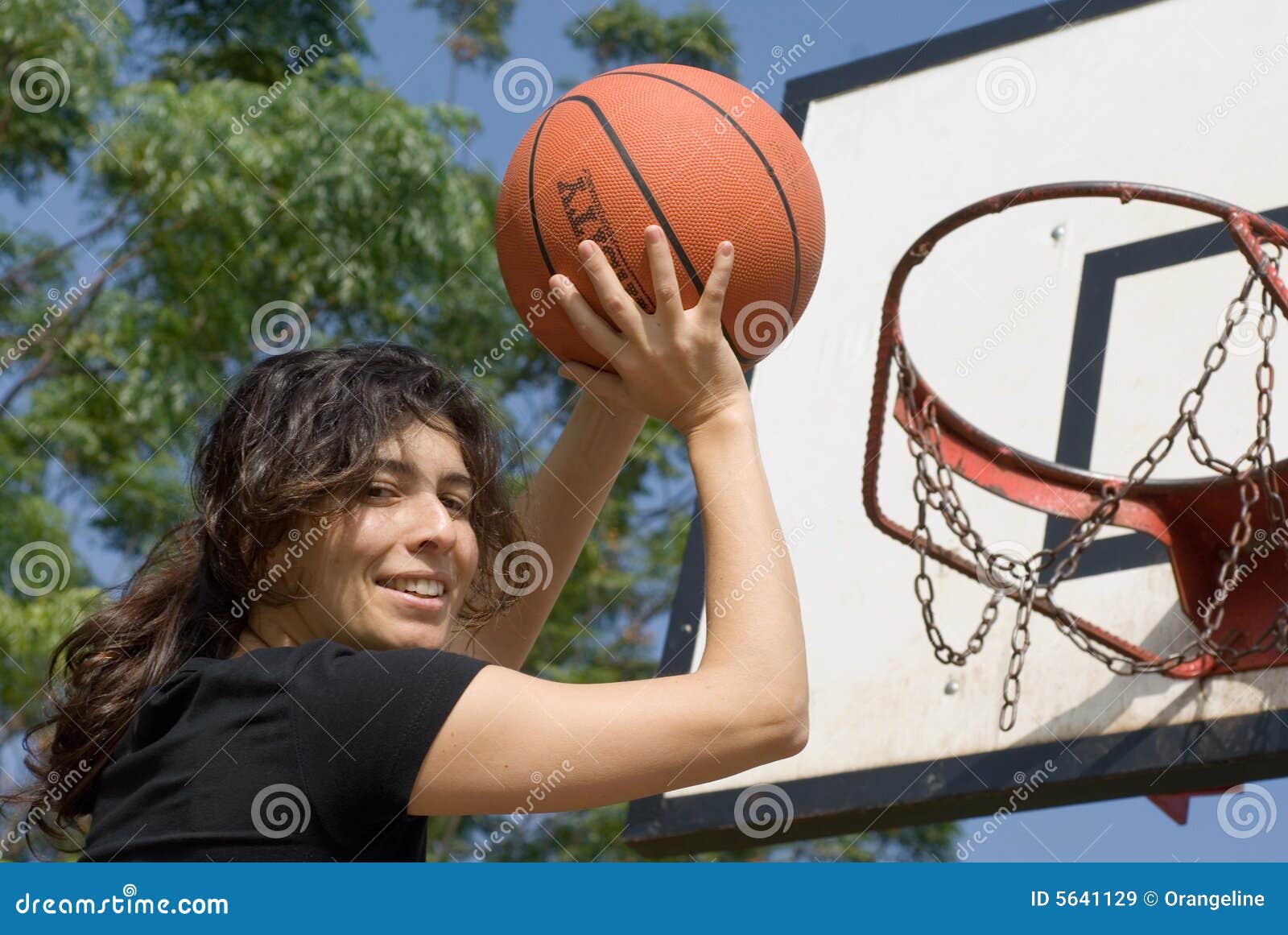 Woman Playing Basketball at Park - Horizontal Stock Image - Image of ...