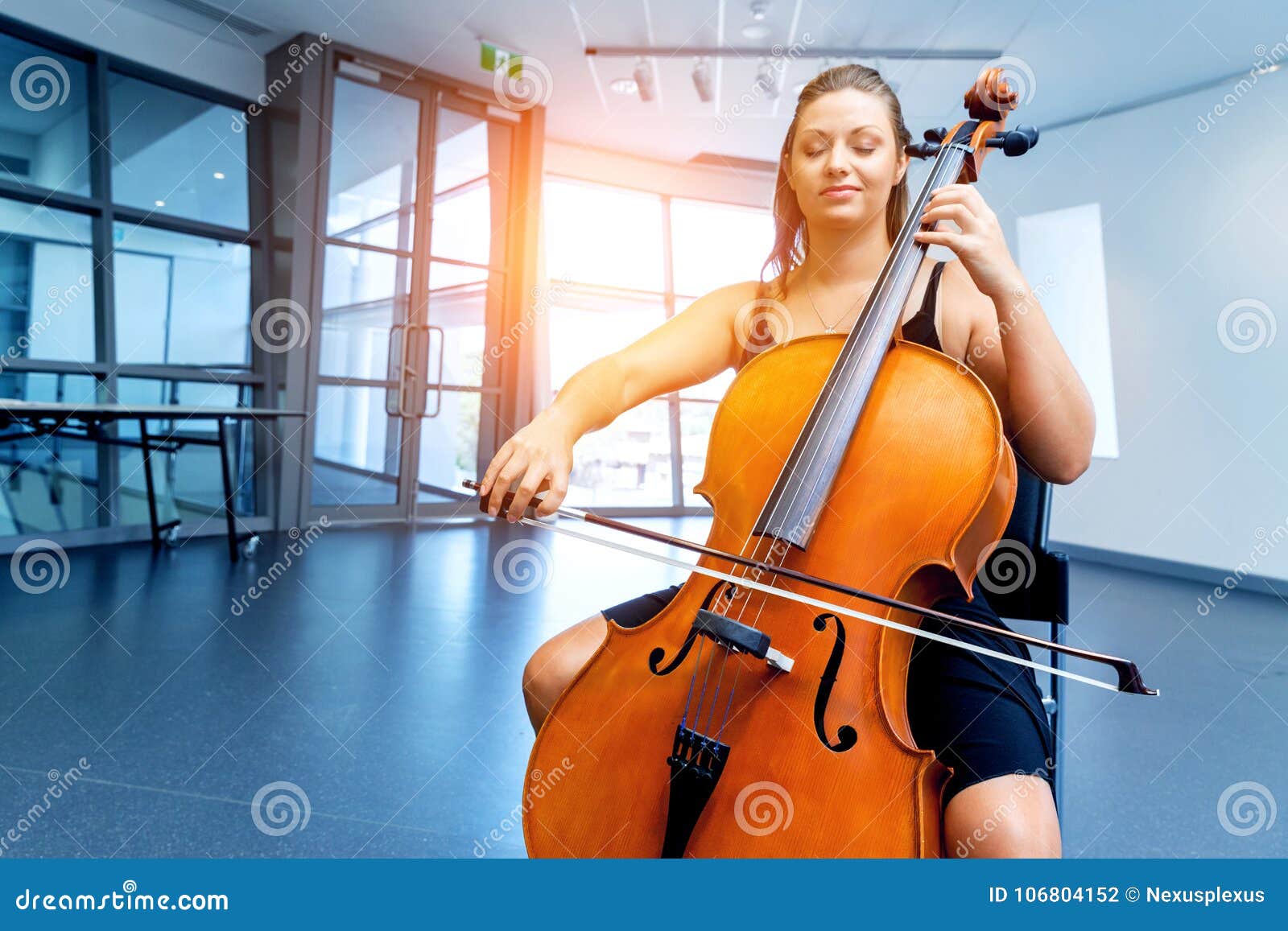 Woman playing cello stock photo. Image of artist, beauty - 106804152