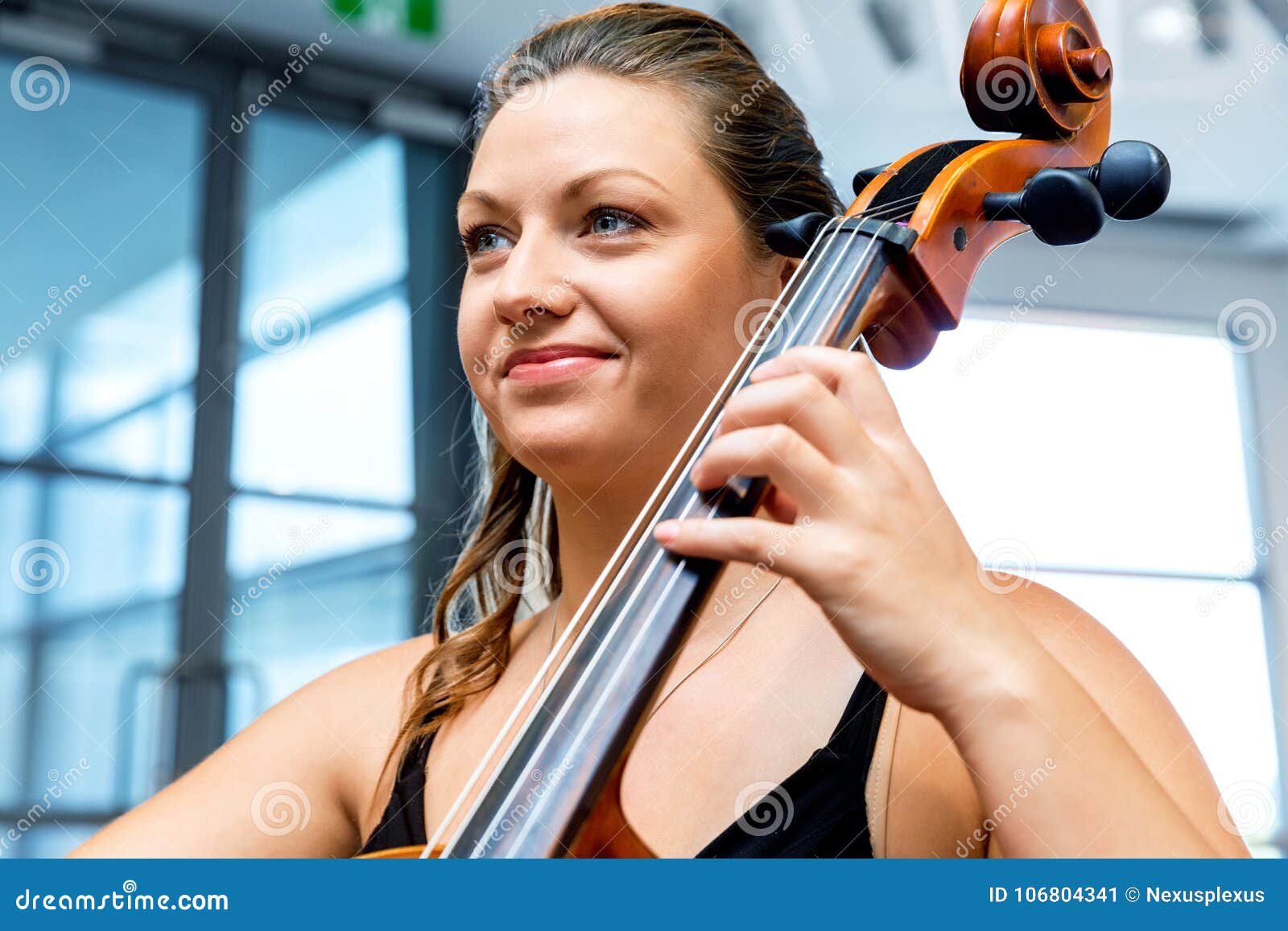 Woman playing cello stock image. Image of studio, performer - 106804341