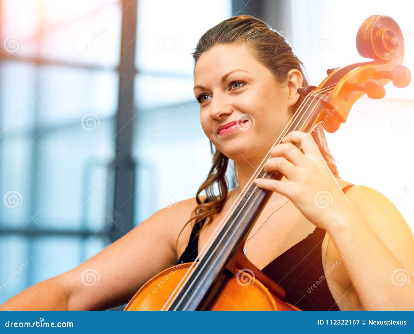 Woman playing cello stock image. Image of professional - 112322167