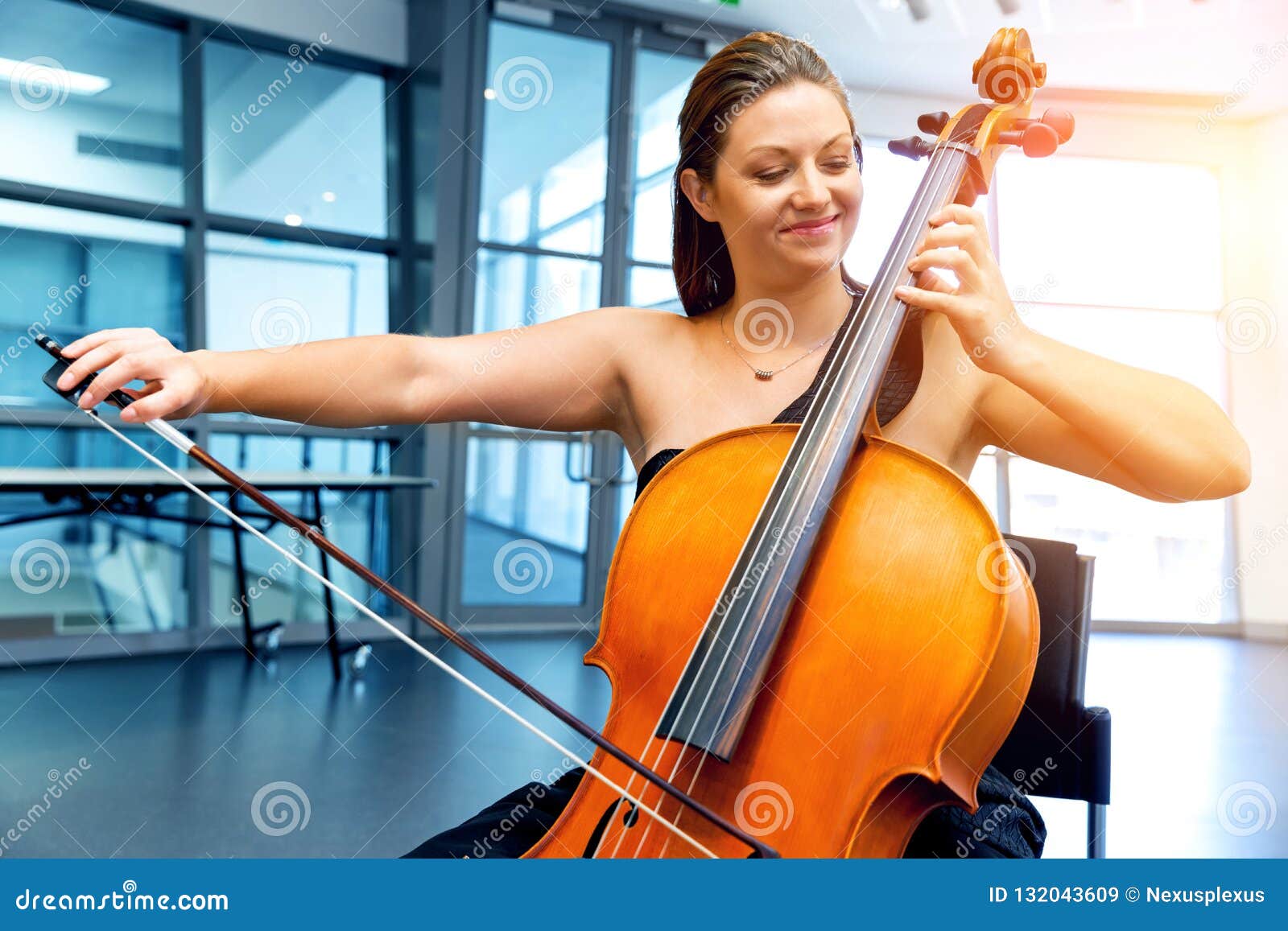 Woman playing cello stock image. Image of musician, classic - 132043609