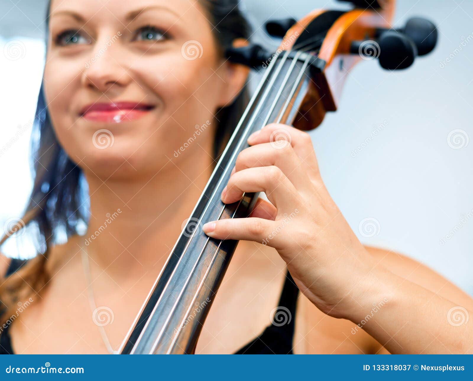 Woman playing cello stock image. Image of classical - 133318037