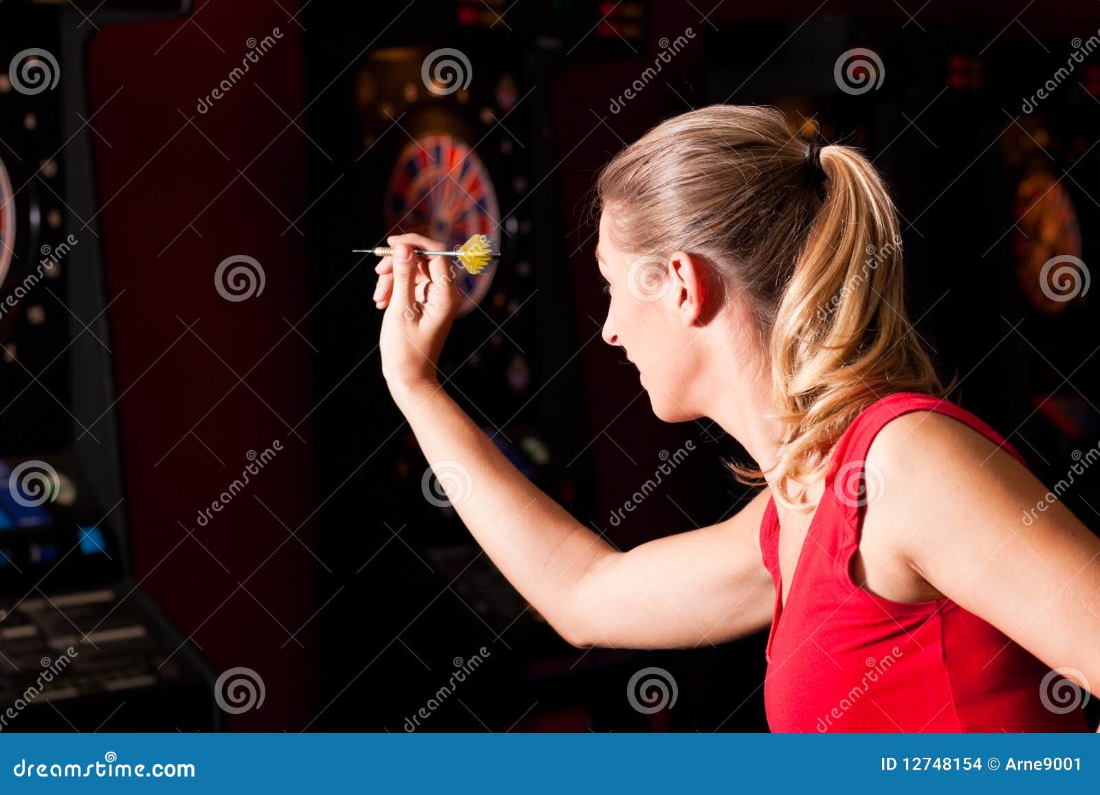 Woman playing darts stock photo. Image of leisure, target - 12748154