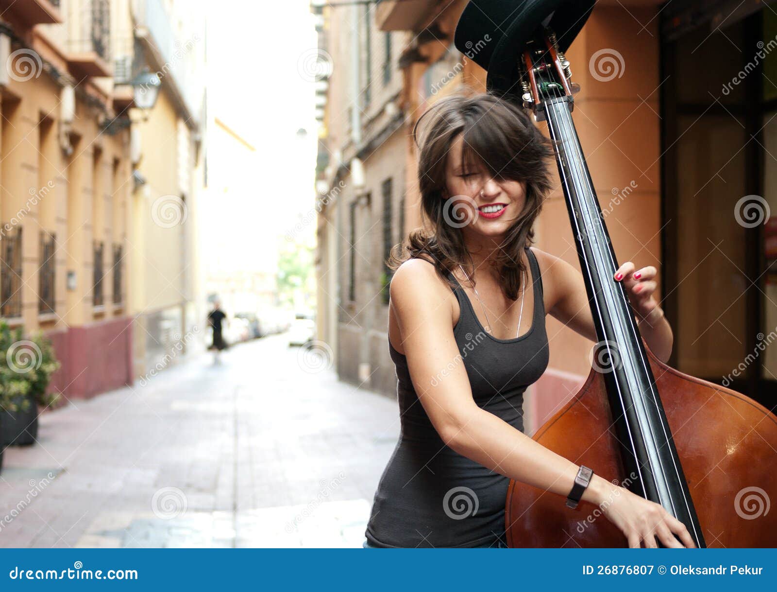 Woman Playing Double Bass on Stock Image - Image of laugh, woman: 26876807