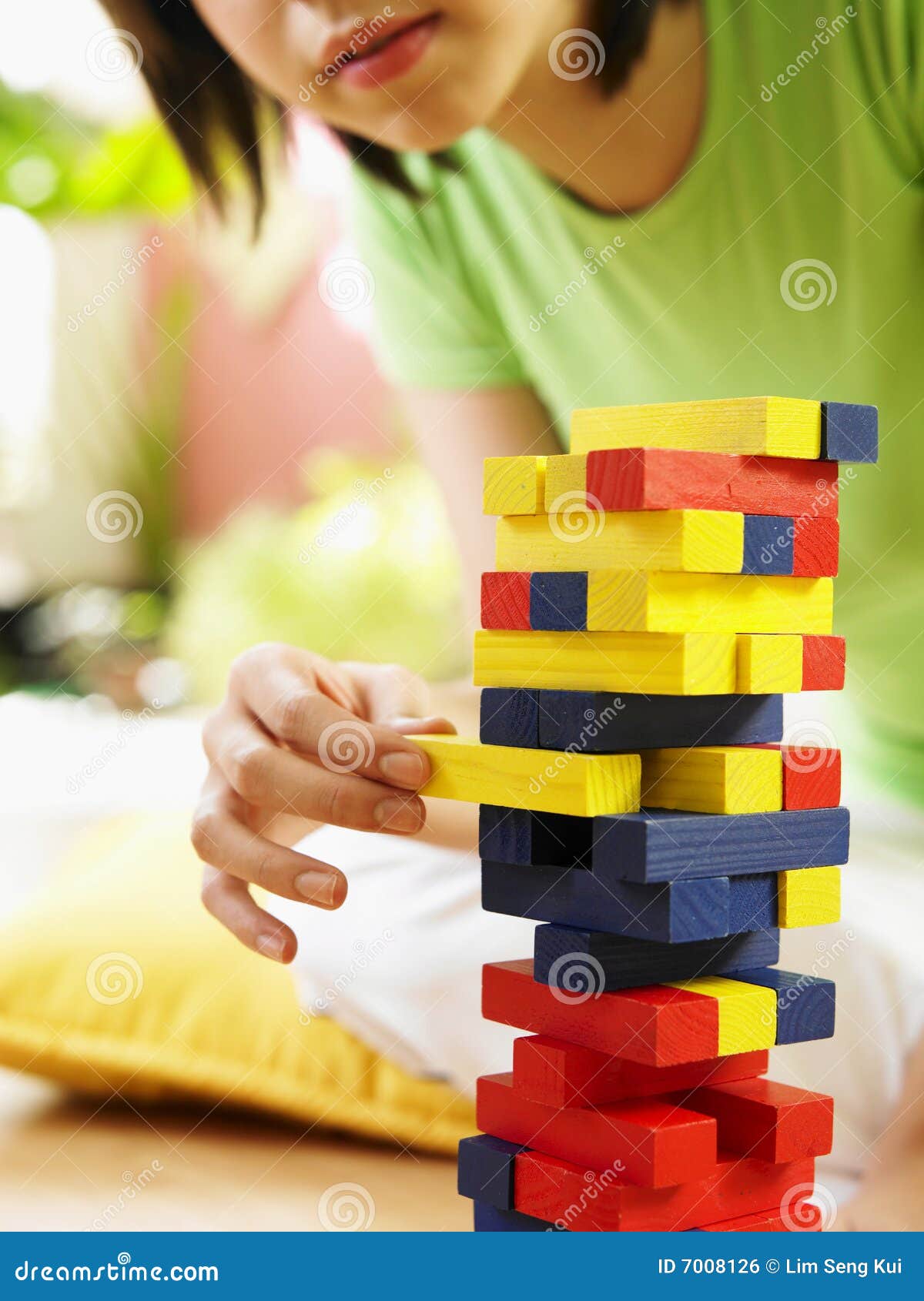 Woman Playing Stack Wood Game Stock Photo - Image of home, happiness ...