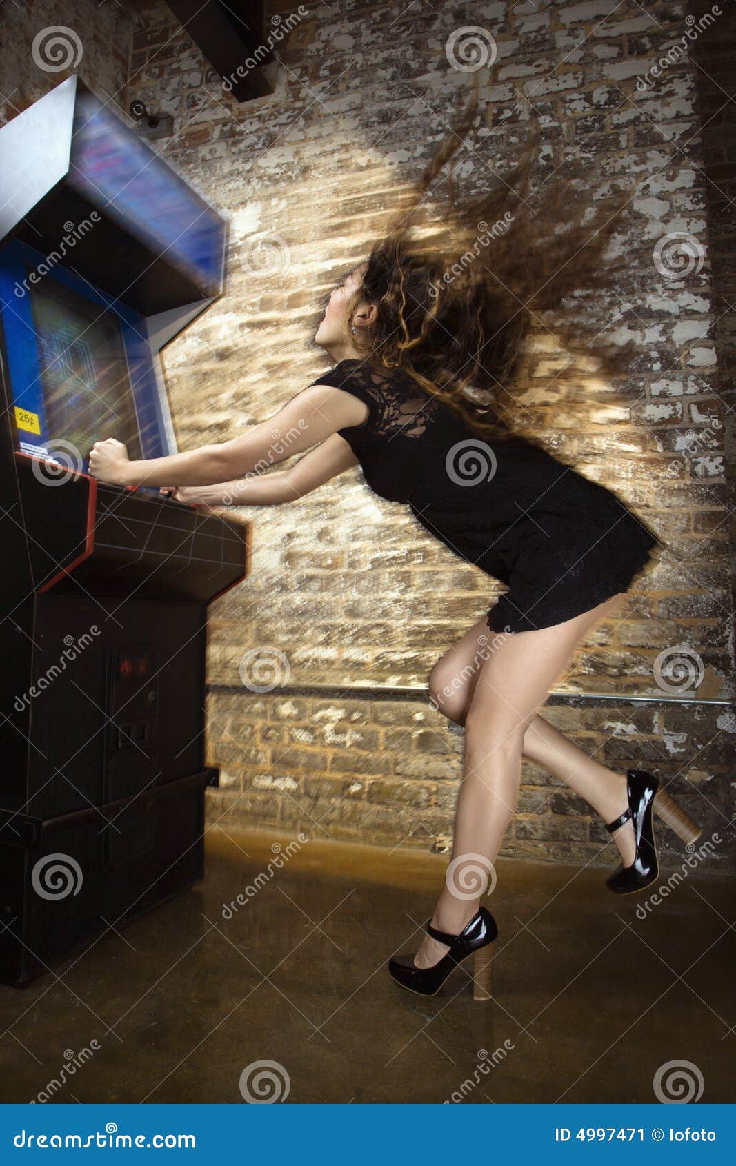 Woman playing video game stock image. Image of arcade - 4997471
