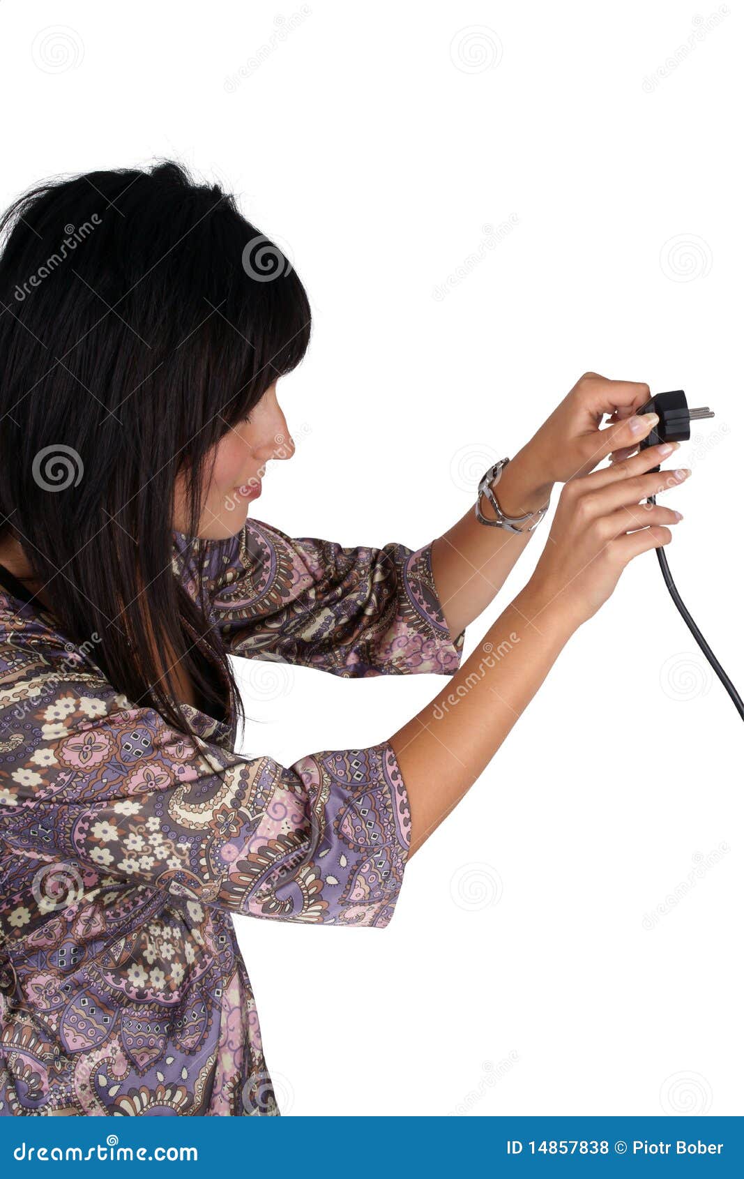 Woman Plugging Electric Cord Stock Photo - Image of wire, looking: 14857838
