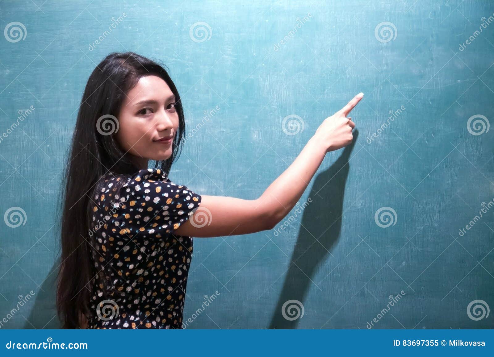 Woman Pointing Finger at Board Stock Image - Image of classroom, guess ...