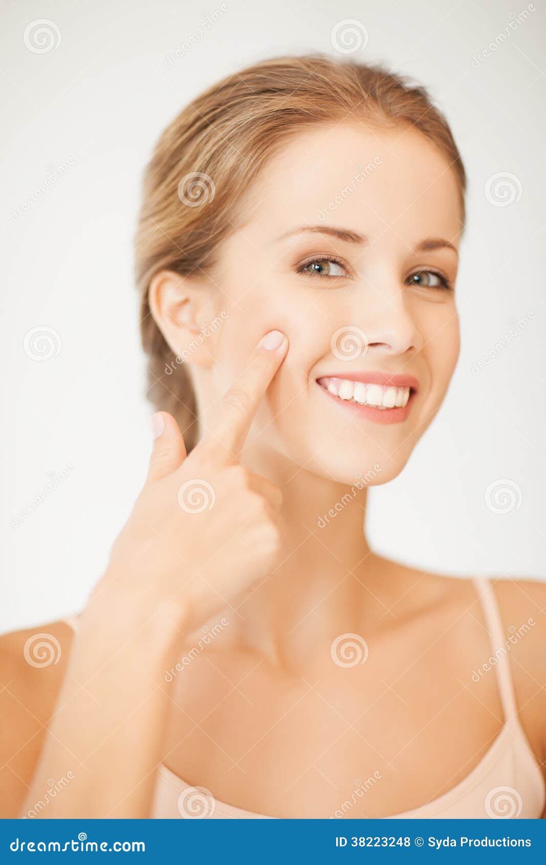 Woman Pointing at Her Cheek Stock Photo - Image of cosmetics, natural ...