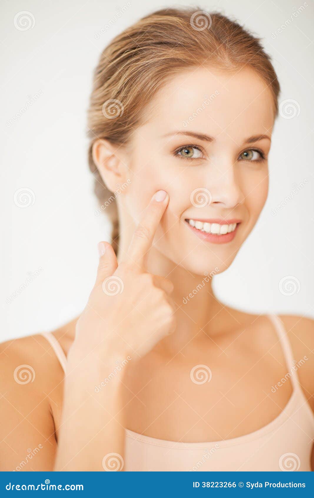 Woman Pointing at Her Cheek Stock Photo - Image of girl, model: 38223266