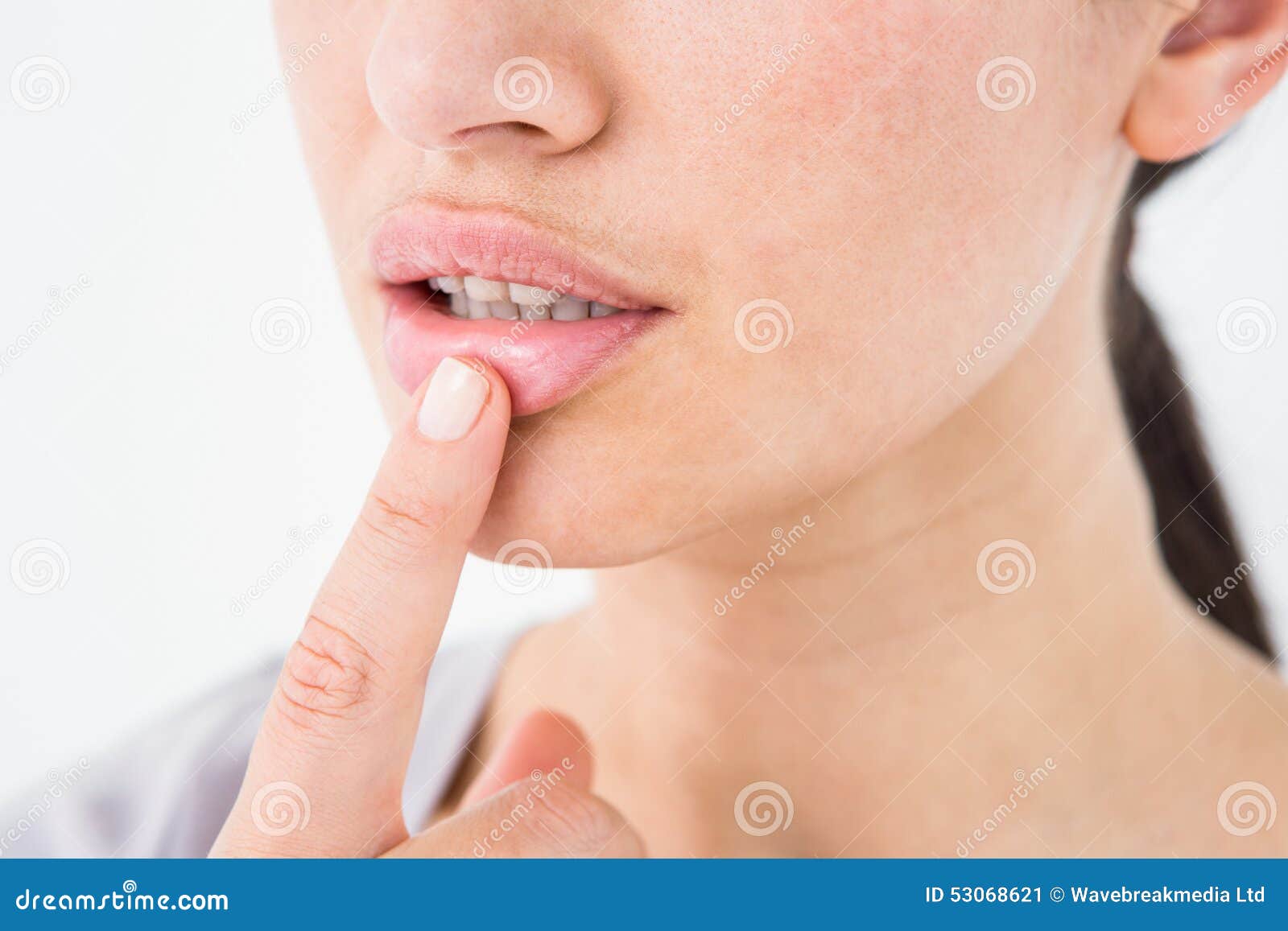 Woman pointing her lip stock image. Image of attractive - 53068621