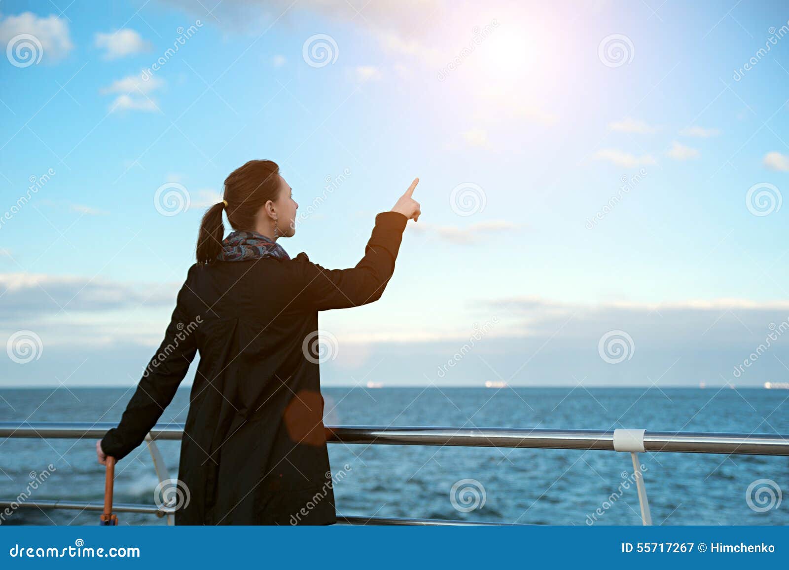 Woman pointing at the sky stock image. Image of thumb - 55717267