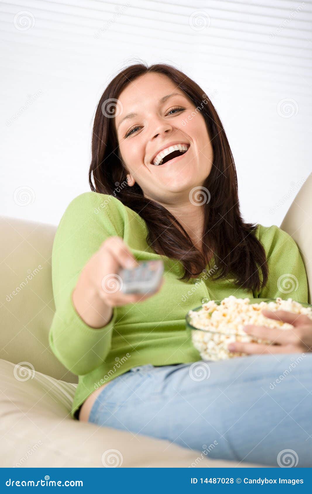 Woman Pointing with Television Remote Control Stock Photo - Image of ...