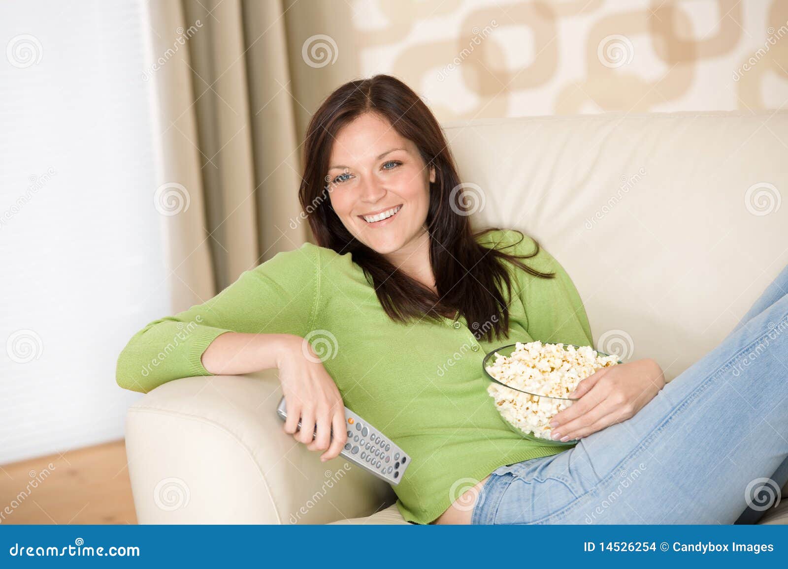 Woman Pointing with Television Remote Control Stock Photo - Image of ...