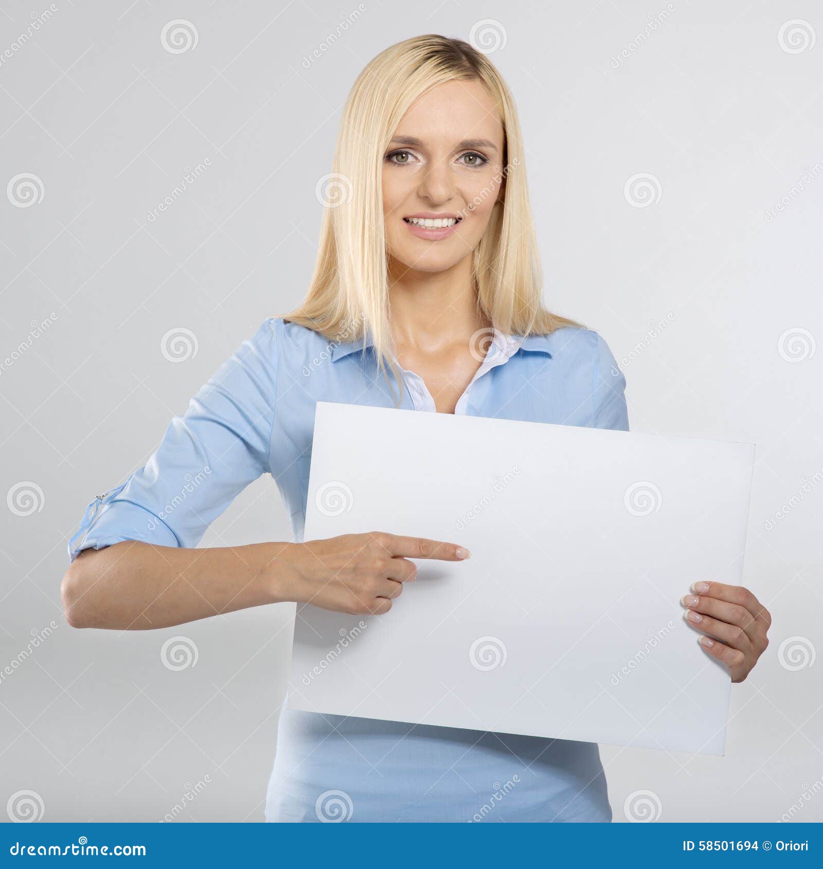 Woman pointing to a board stock photo. Image of banners - 58501694