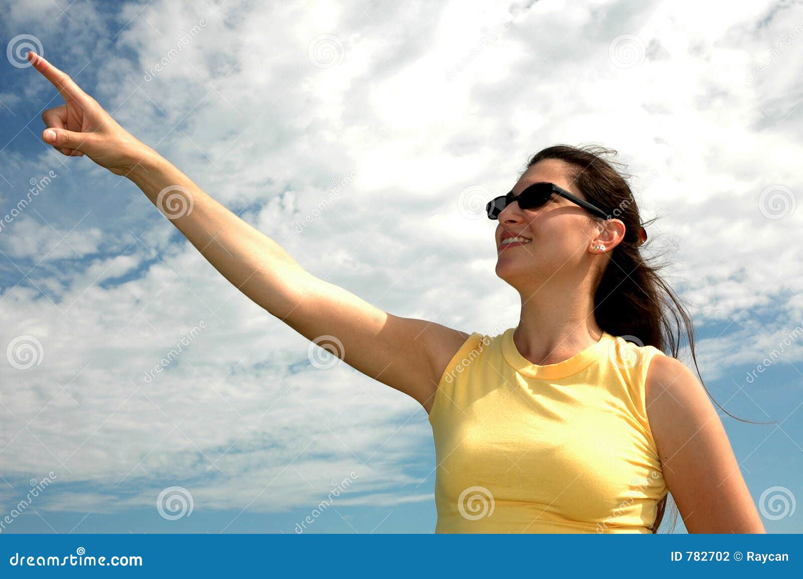 Woman pointing to sky stock photo. Image of clouds, hair - 782702