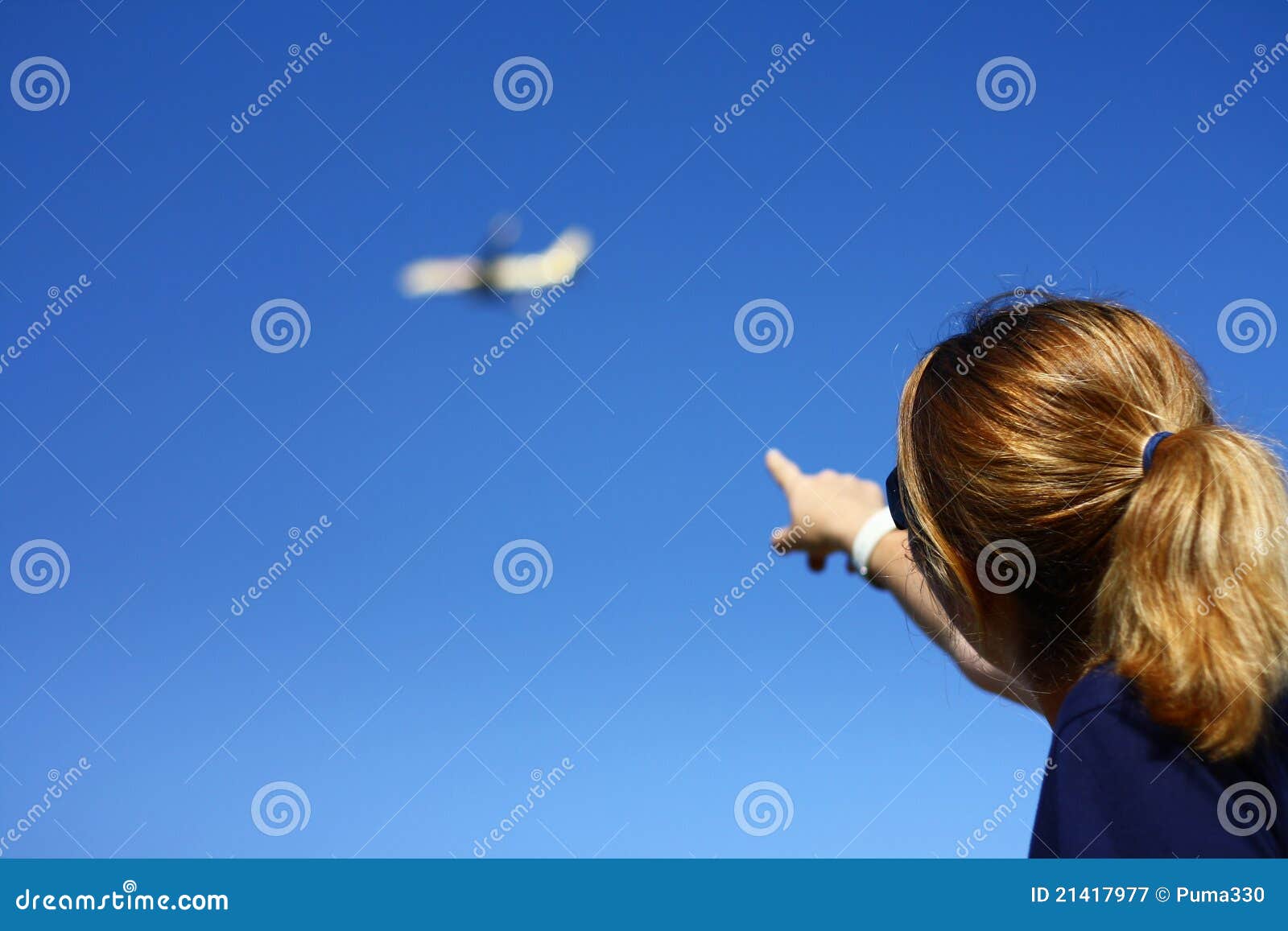 Woman Pointing Towards the Blue Sky Stock Image - Image of outstretched ...