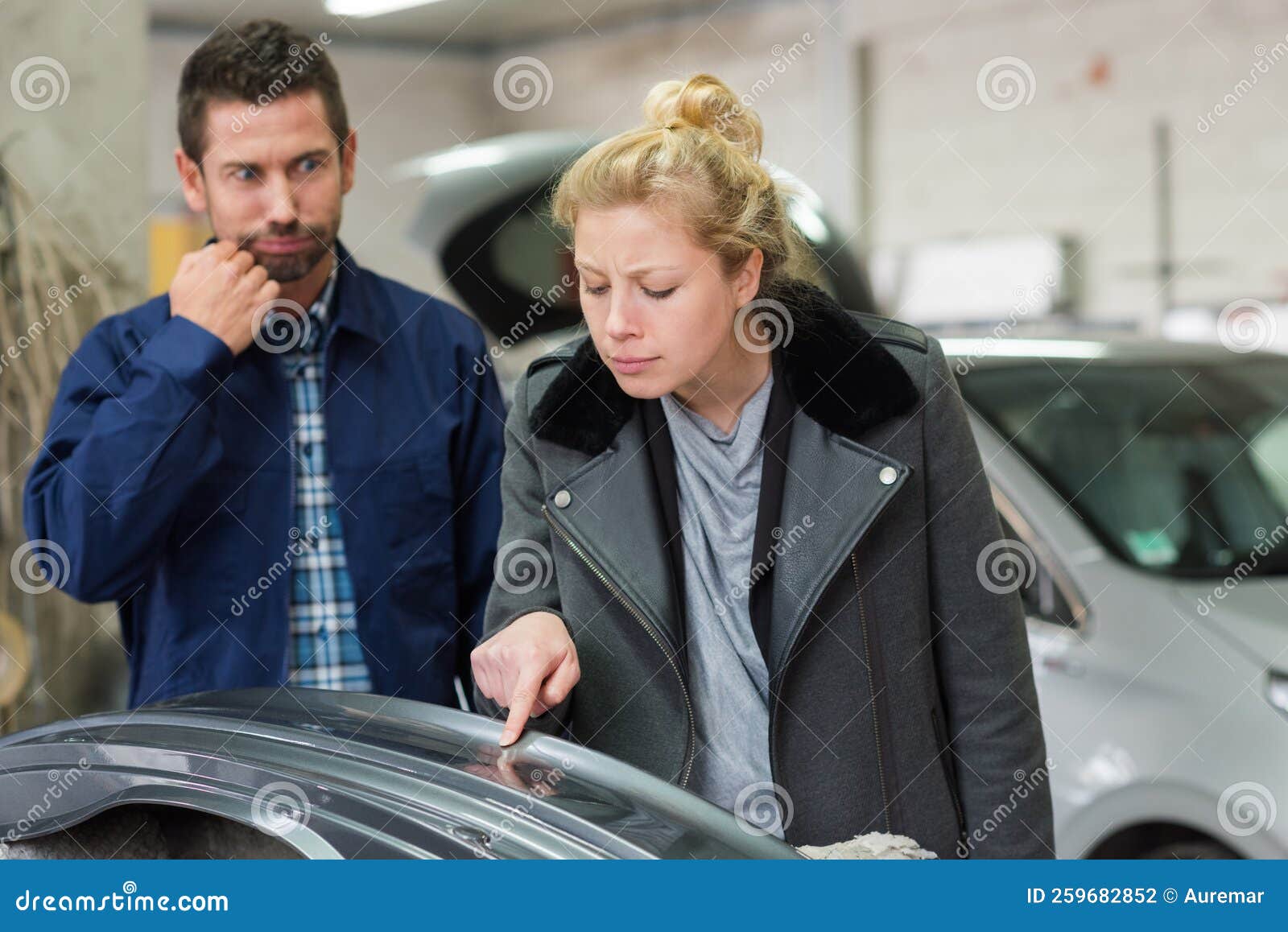Woman Pointing at Vehicle Panel Damage Man Making Exasperated ...