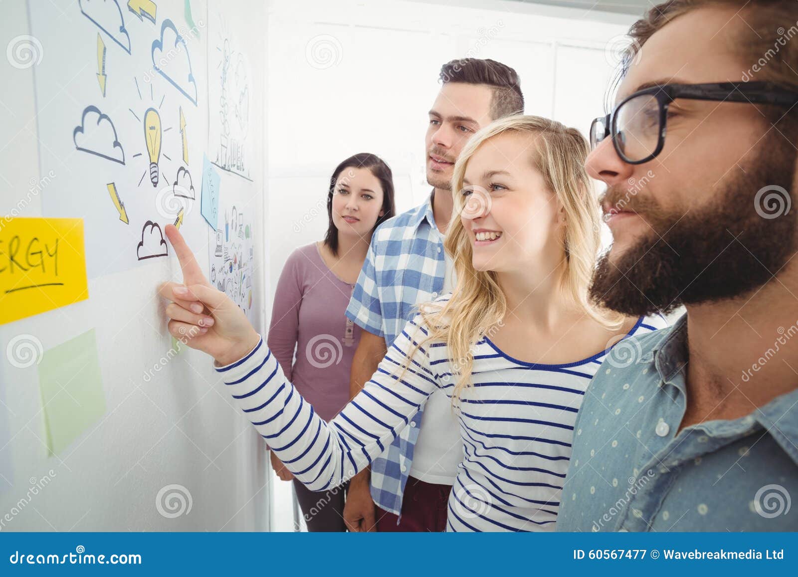 Woman Pointing at Wall with Sticky Notes and Drawings Stock Image ...
