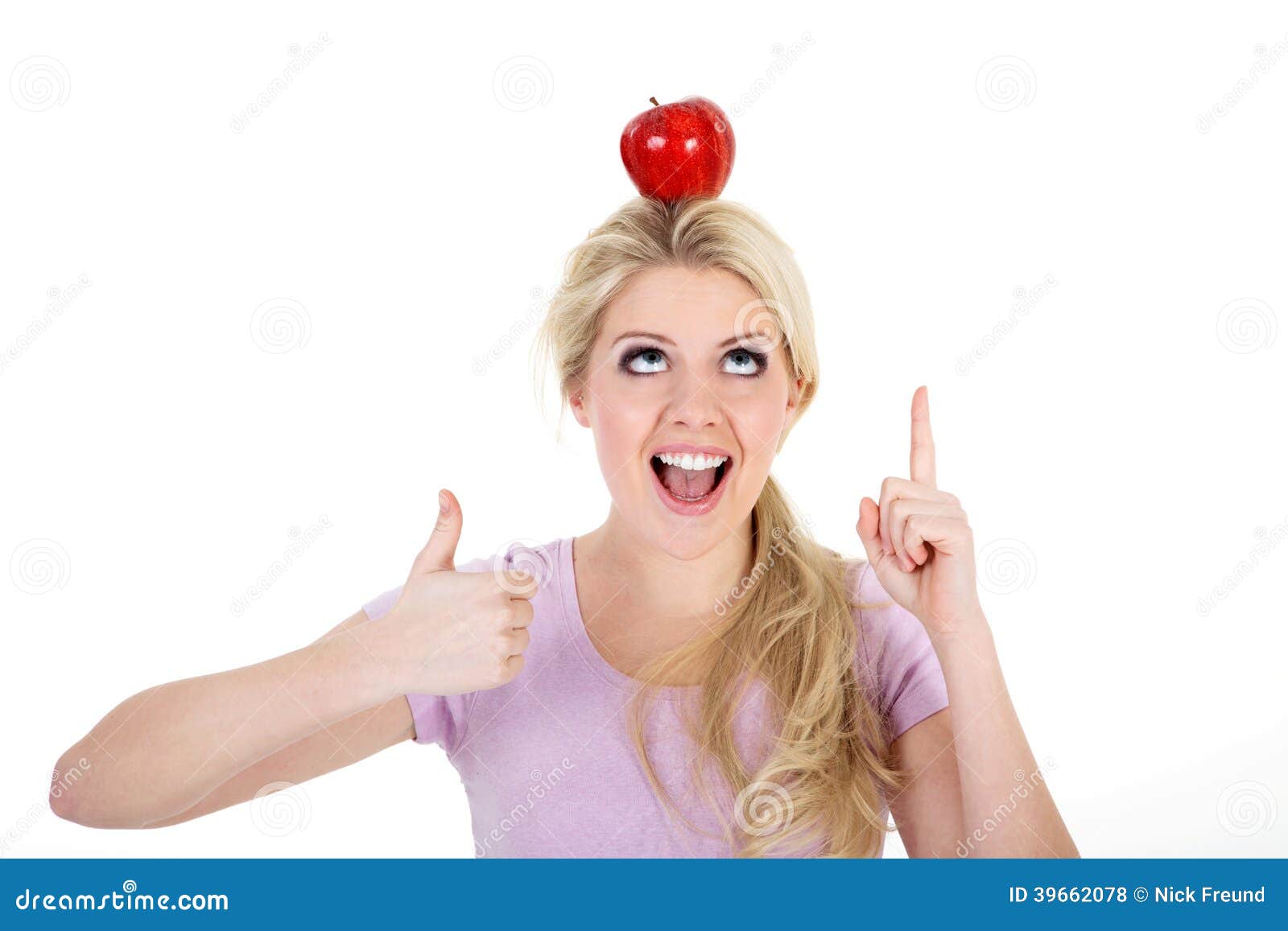 Woman poised with an apple stock photo. Image of balance - 39662078