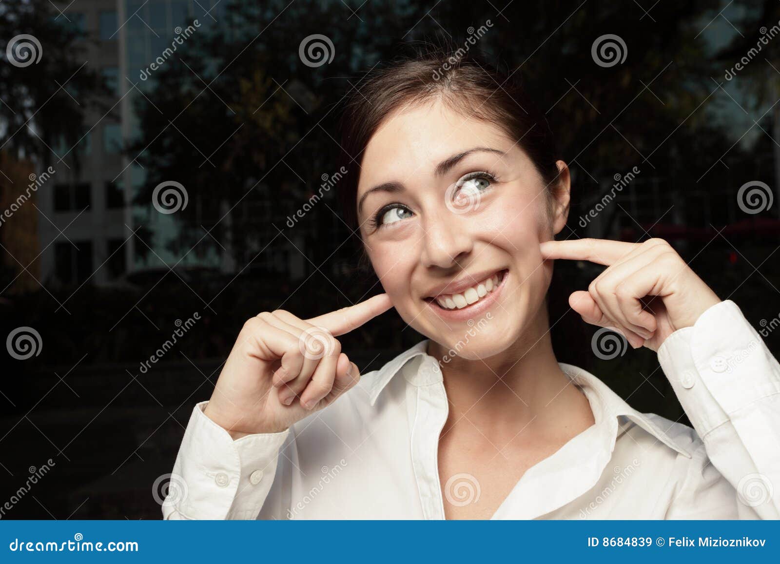 Woman poking her cheeks stock image. Image of headshot - 8684839