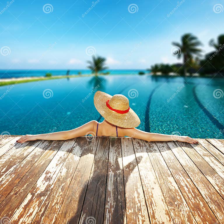 Woman at poolside stock photo. Image of girl, idyllic - 86395342