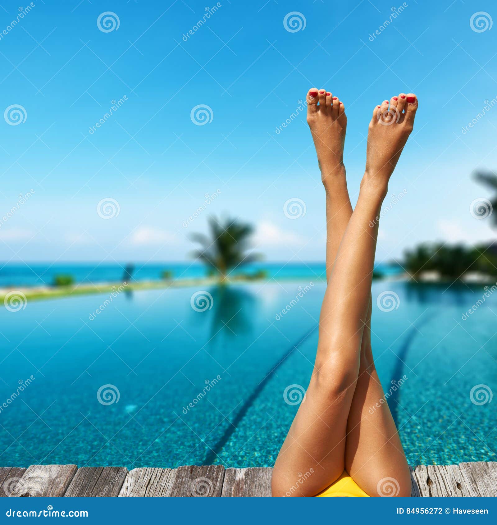 Woman at poolside stock photo. Image of person, enjoyment - 84956272