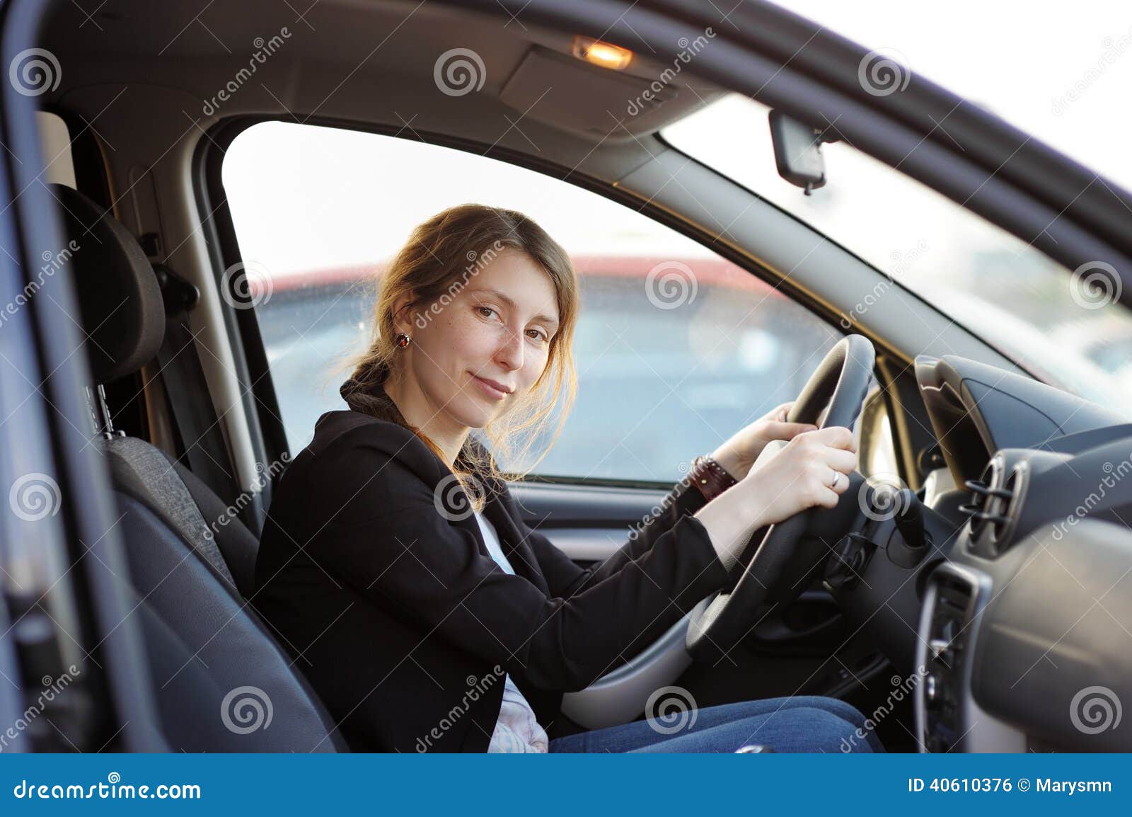 Woman portrait in a car stock photo. Image of owner, lease - 40610376