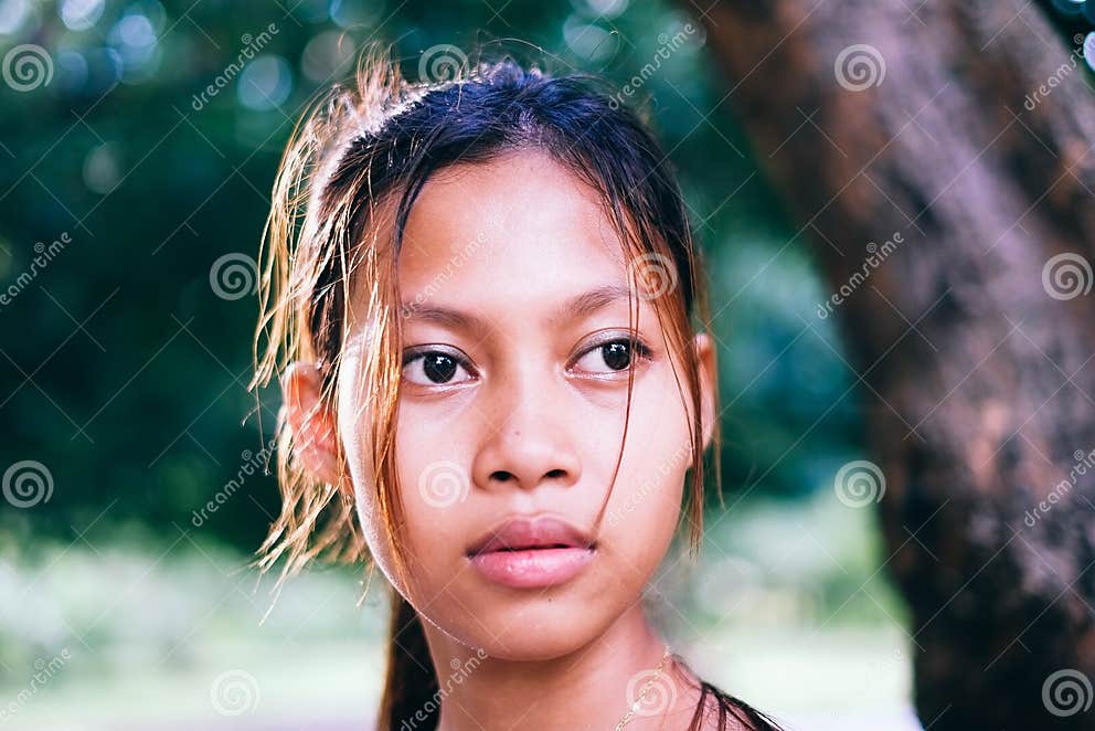 Woman Portrait Of Lovely And Beautiful Asian Young Girl Outdoor On The Tree In The Park Stock