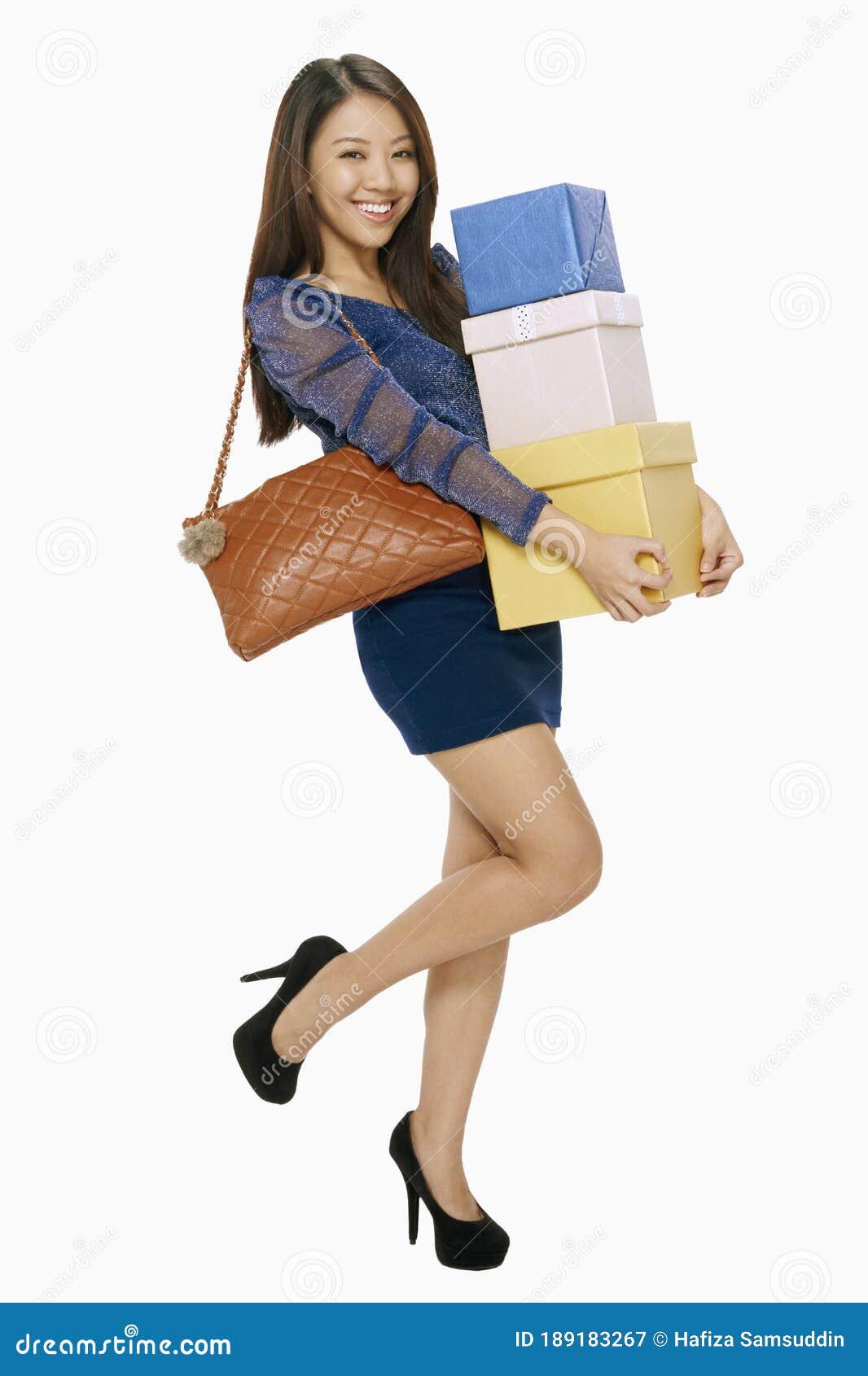 Woman Posing and Carrying a Stack of Boxes. Conceptual Image Stock ...