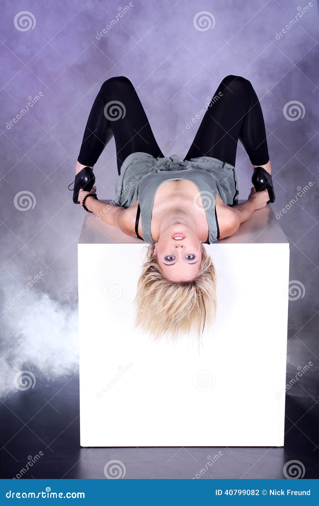 Woman posing on the cube stock photo. Image of hair, posing - 40799082