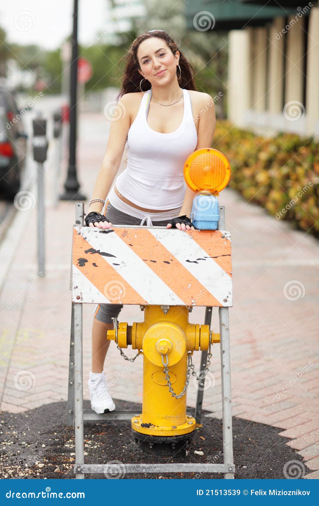 Woman Posing by a Fire Hydrant Stock Image - Image of fitness, female ...