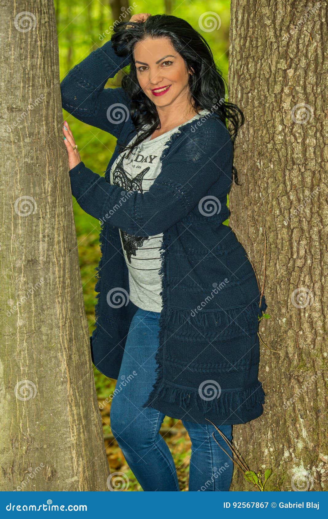 Woman posing in the forest stock image. Image of smile - 92567867