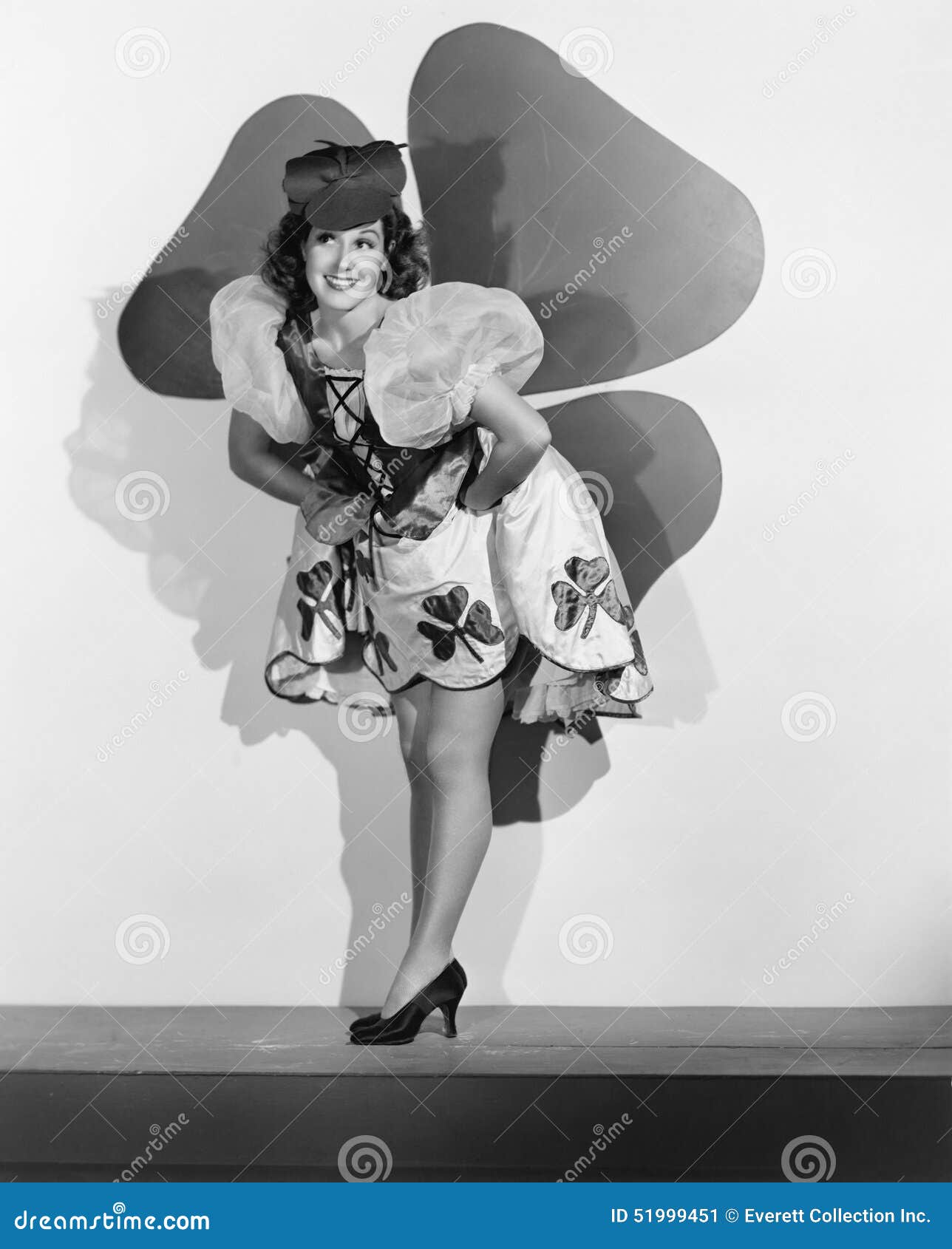 Woman Posing in Front of Large Shamrock Stock Image - Image of decorate ...