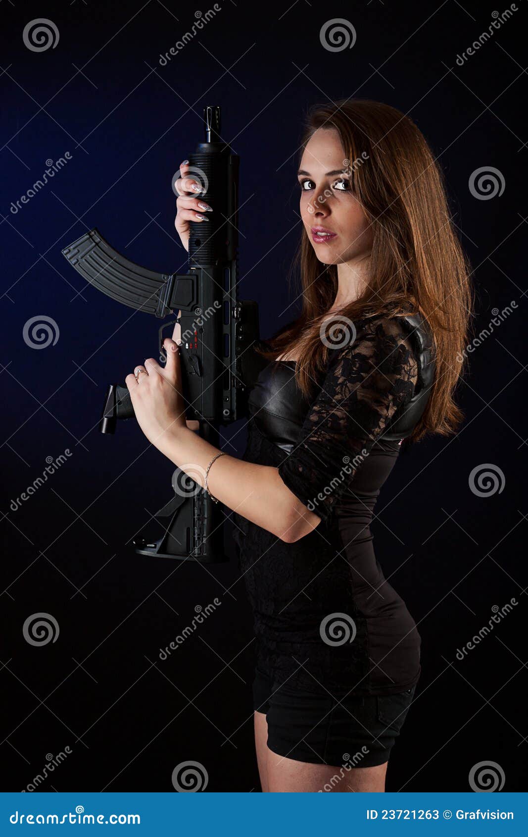 Woman posing with guns stock image. Image of fashion - 23721263