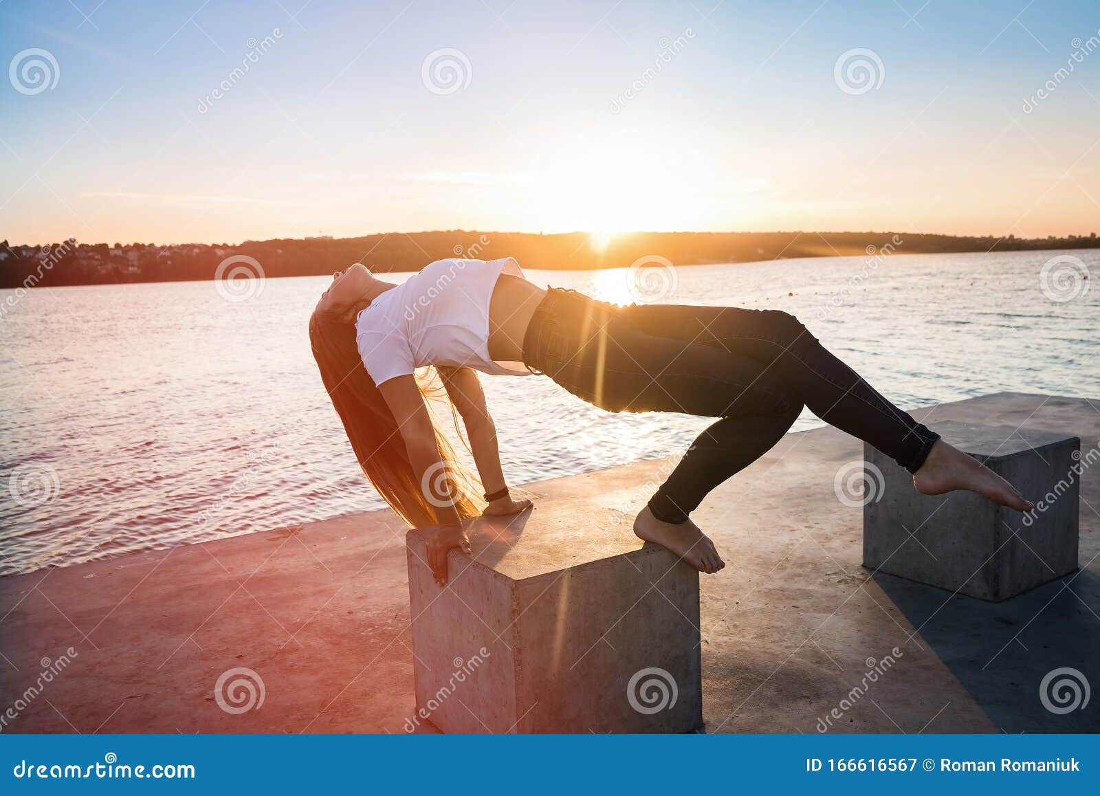 Woman Posing at Lakeshore Sitting at Cube Stock Image - Image of ...