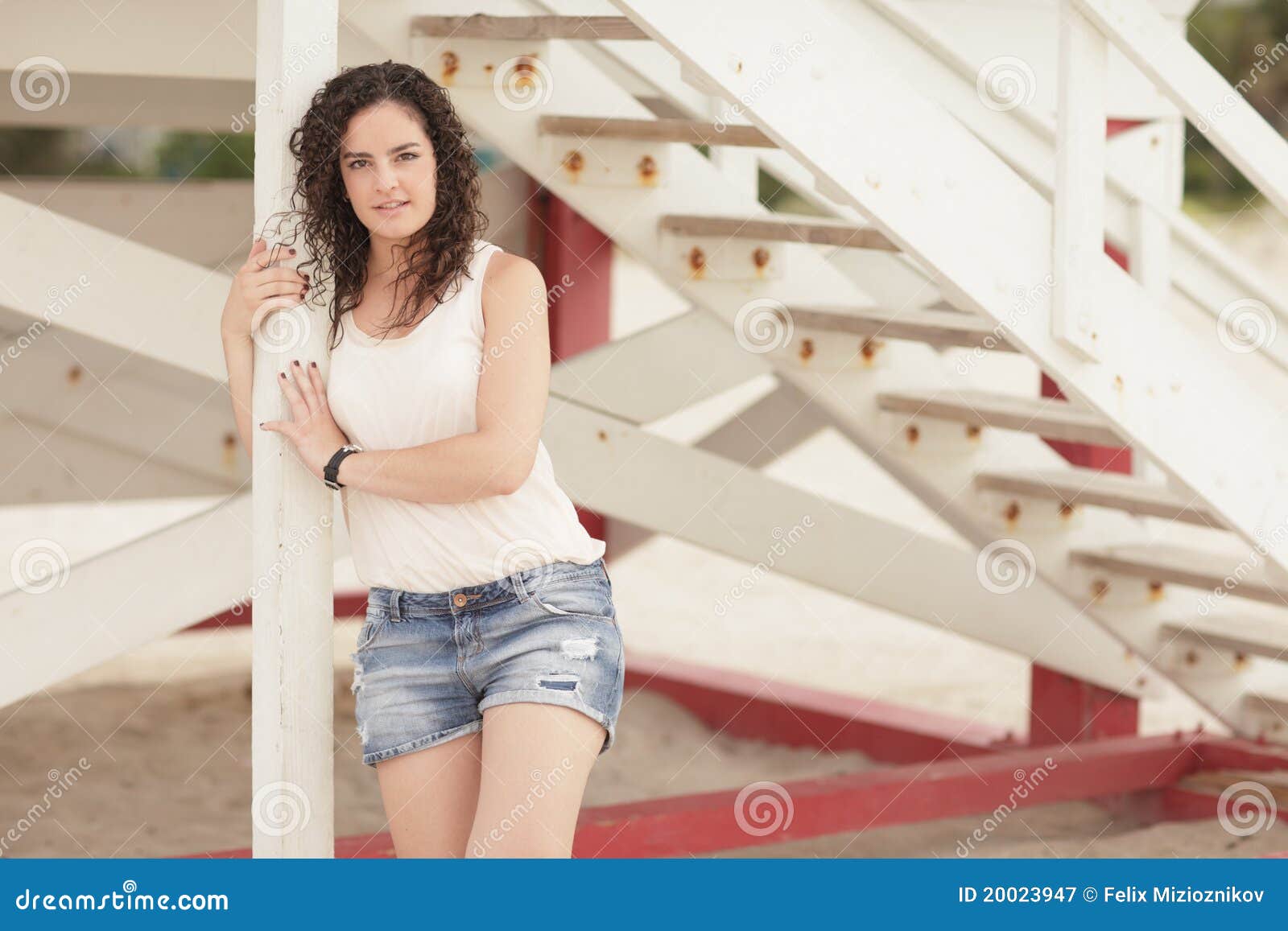Woman Posing by a Lifeguard Hut Stock Image - Image of lifeguard ...