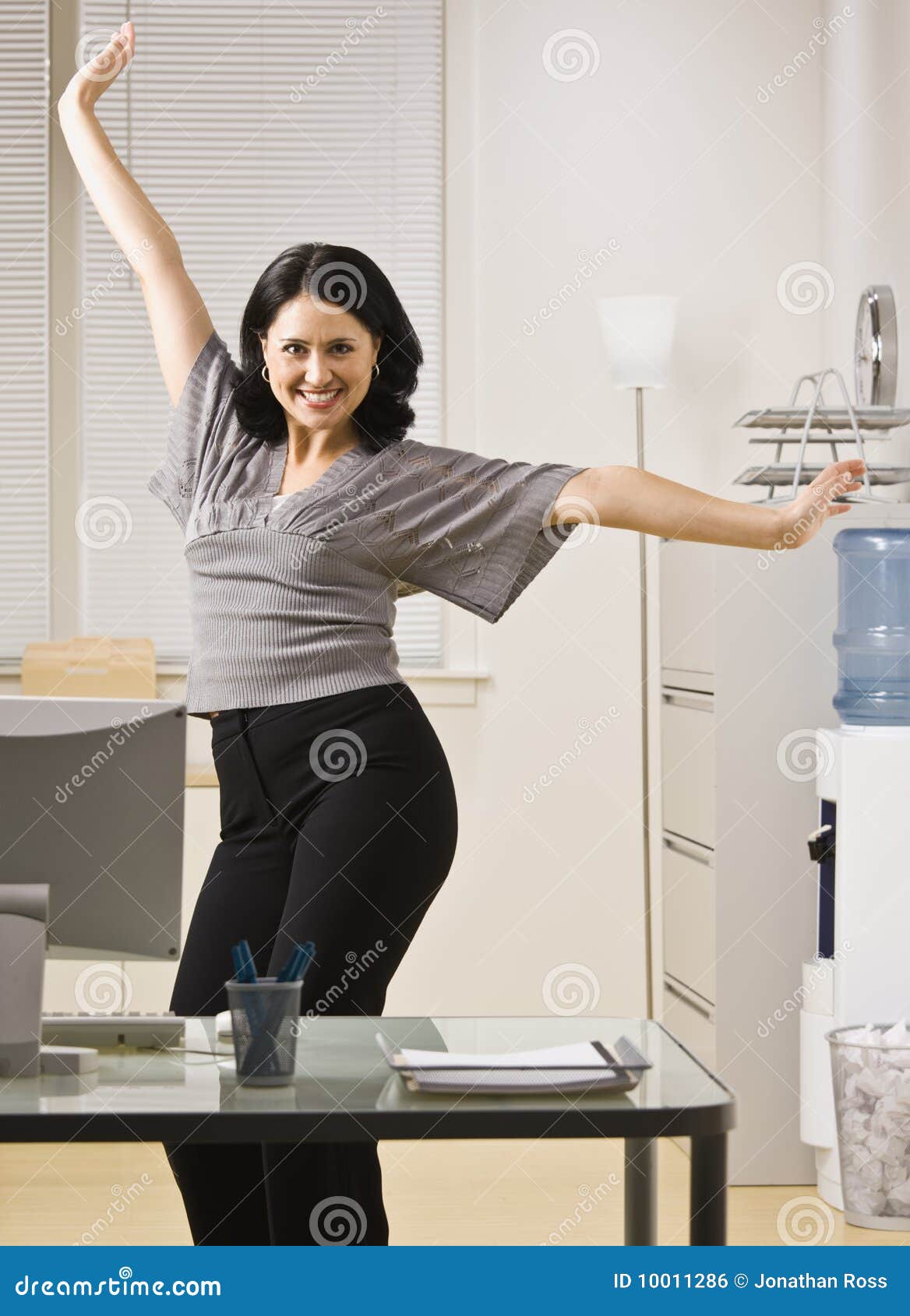 Woman Posing in Office stock photo. Image of clothing - 10011286