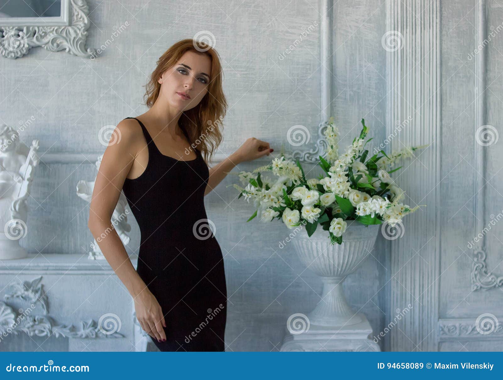 Woman Posing in a Photo Studio with Flowers Stock Image - Image of hair ...