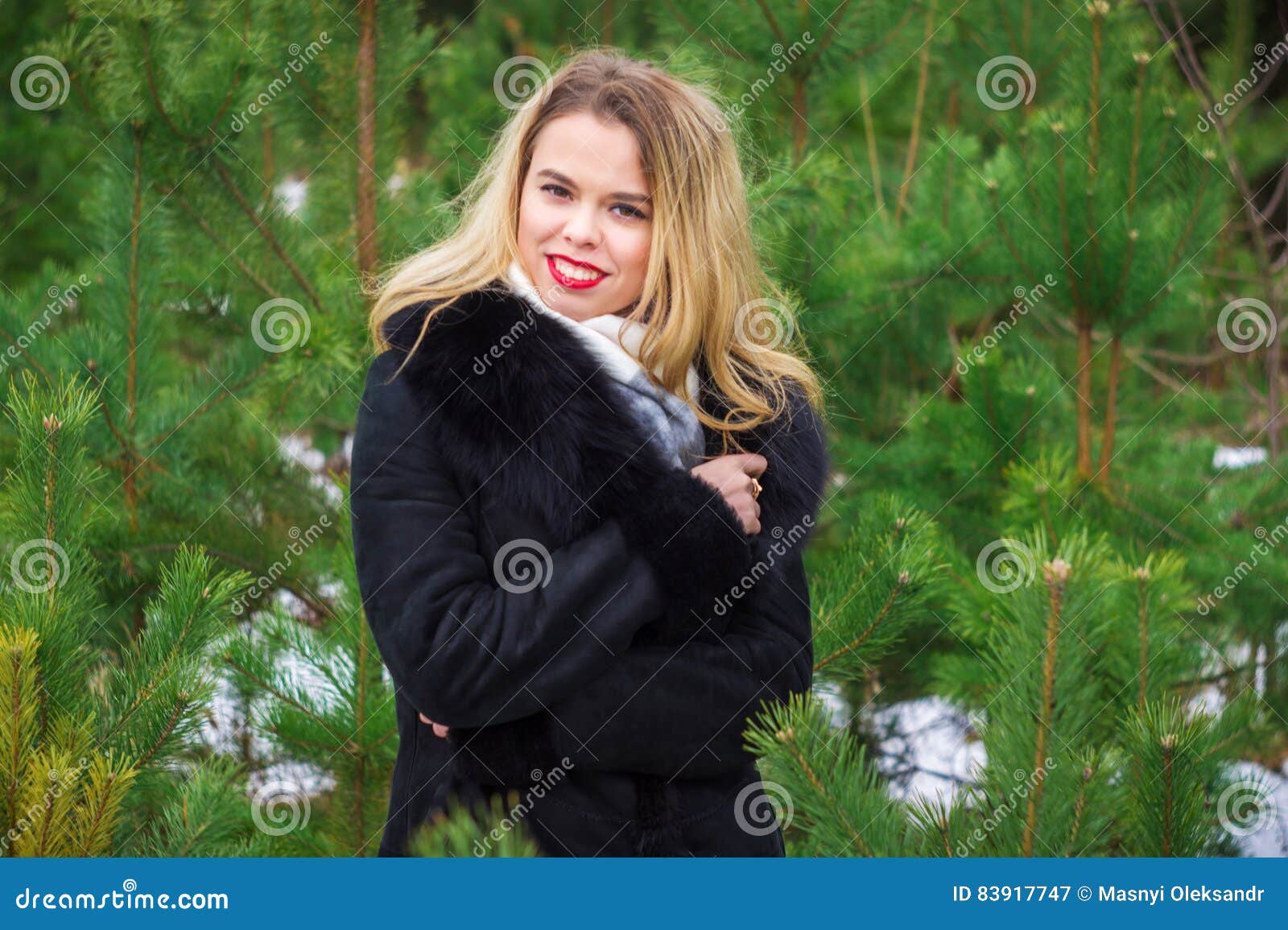 Woman posing in pines stock image. Image of frosty, camera - 83917747