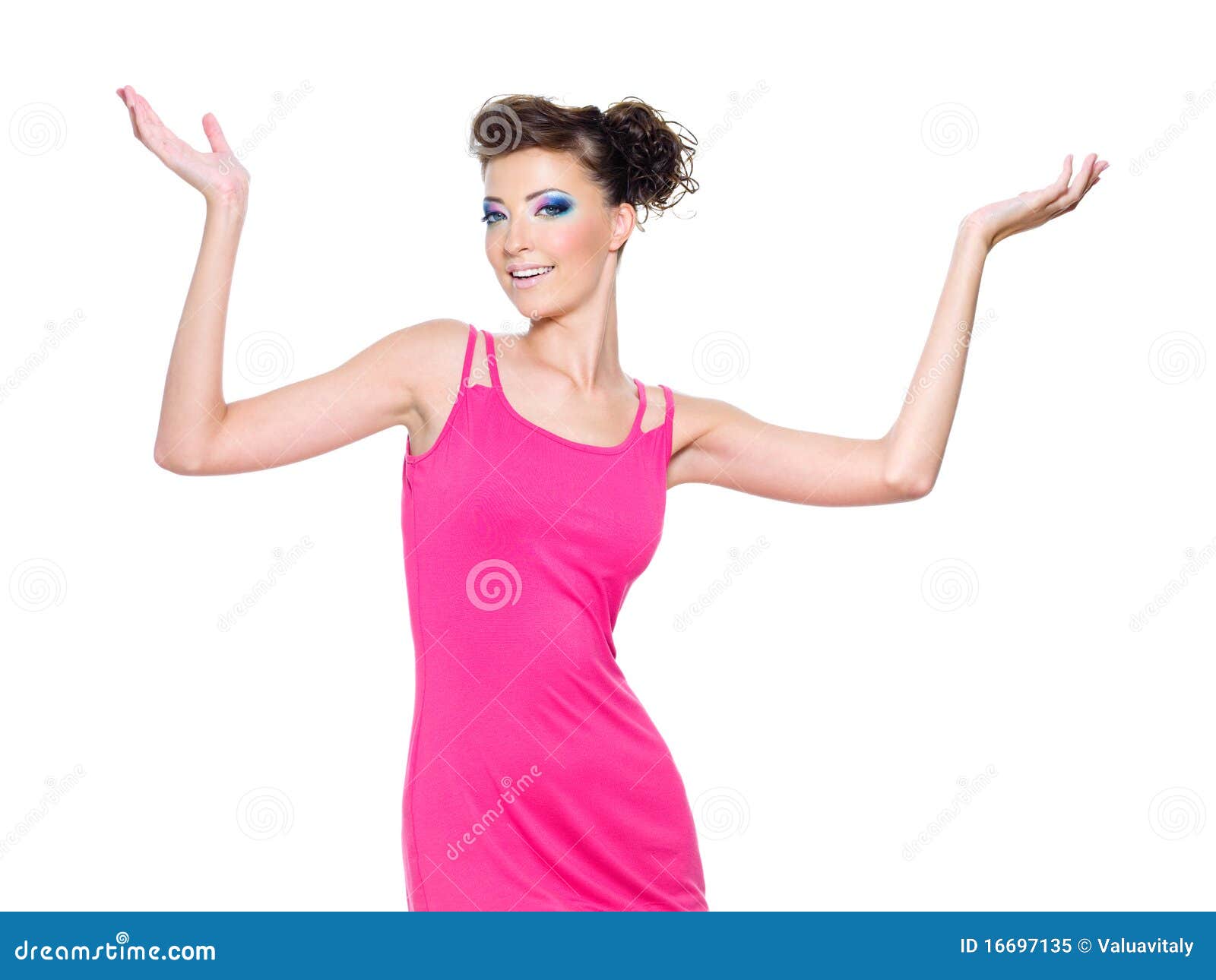 Woman Posing in Pink with Hands Lifted Upwards Stock Image - Image of ...