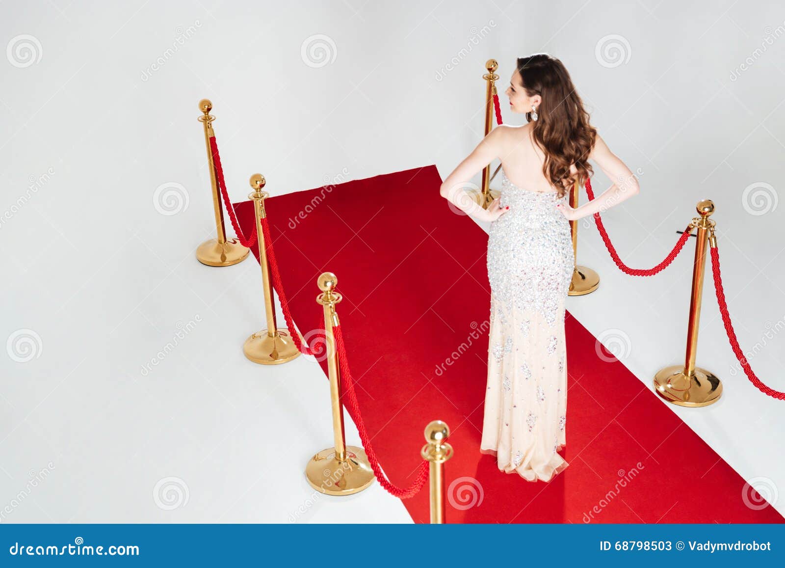 Woman posing on red carpet stock image. Image of back - 68798503