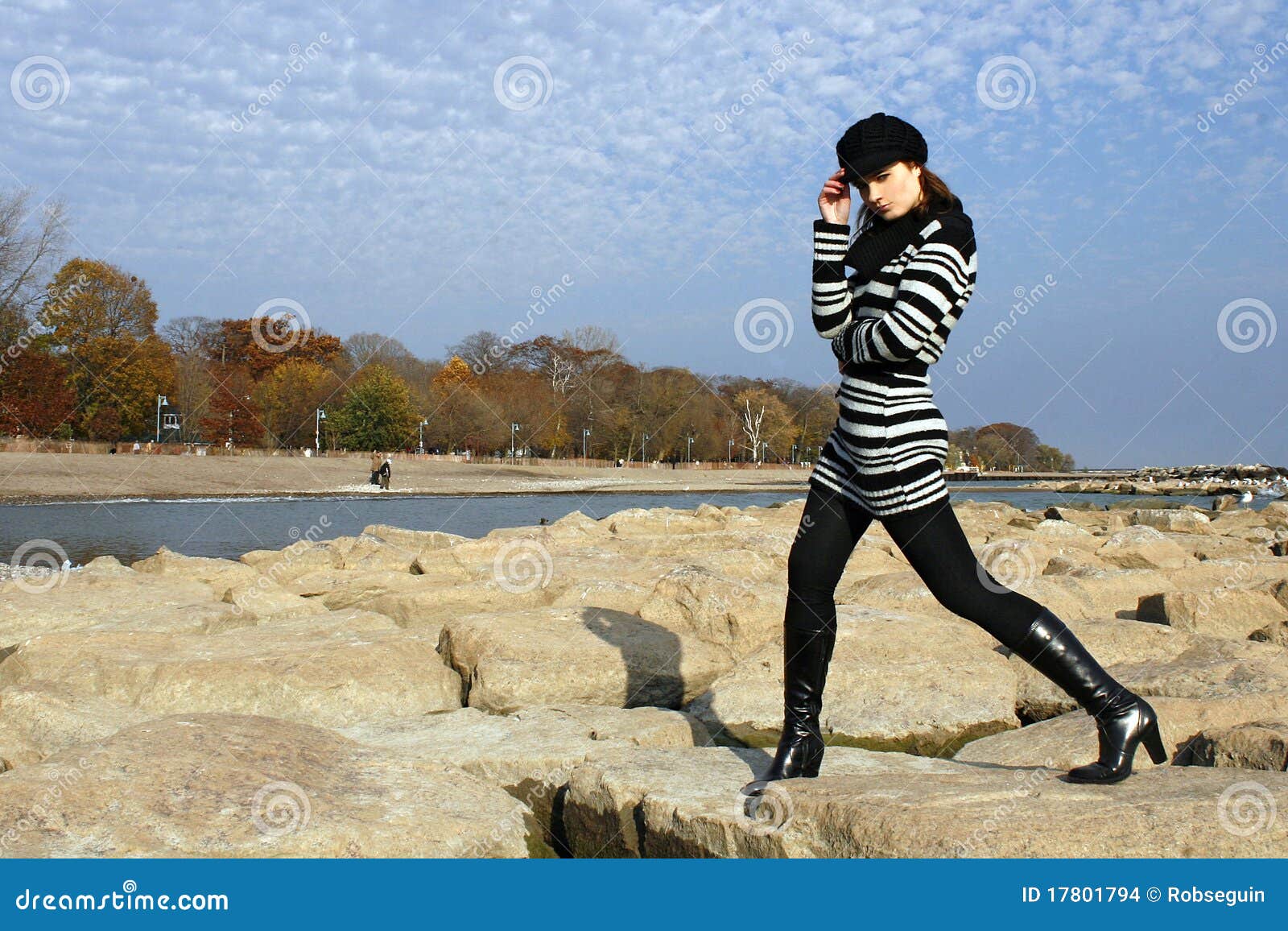 Woman posing on the rocks stock photo. Image of girl - 17801794