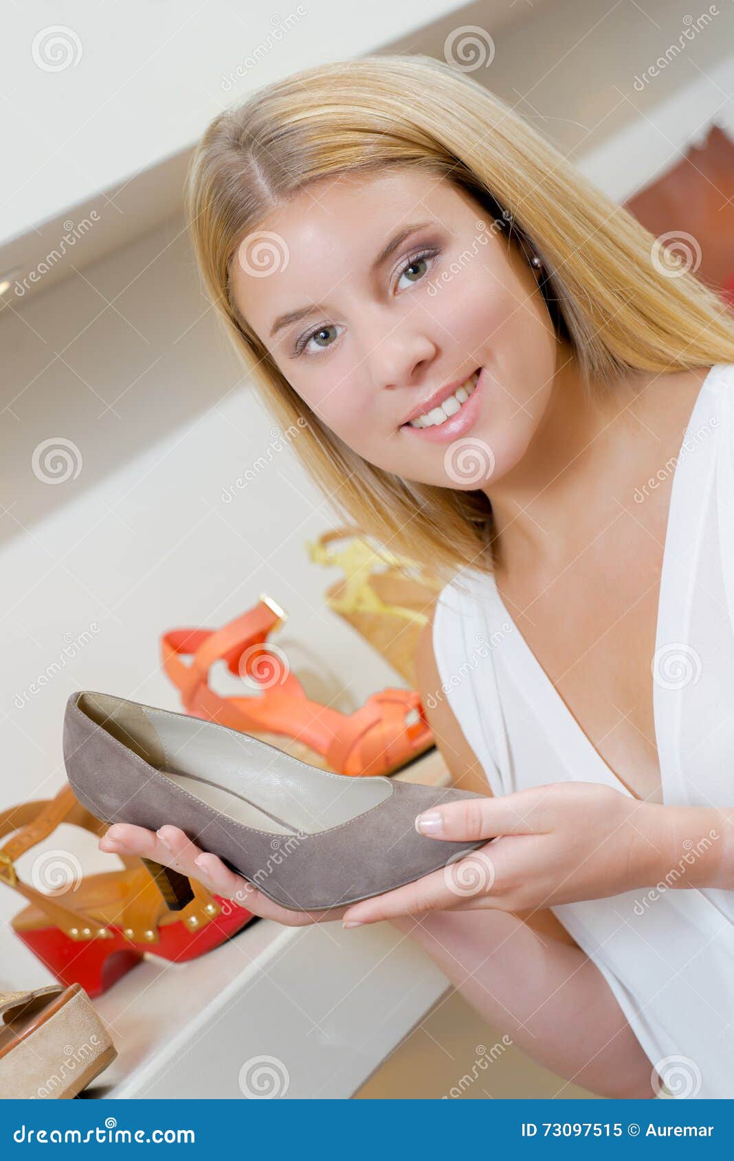 Woman posing with shoe stock image. Image of propose - 73097515