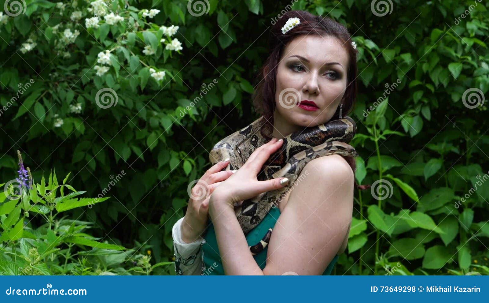 Woman Posing with a Snake Around Her Neck Stock Footage - Video of ...