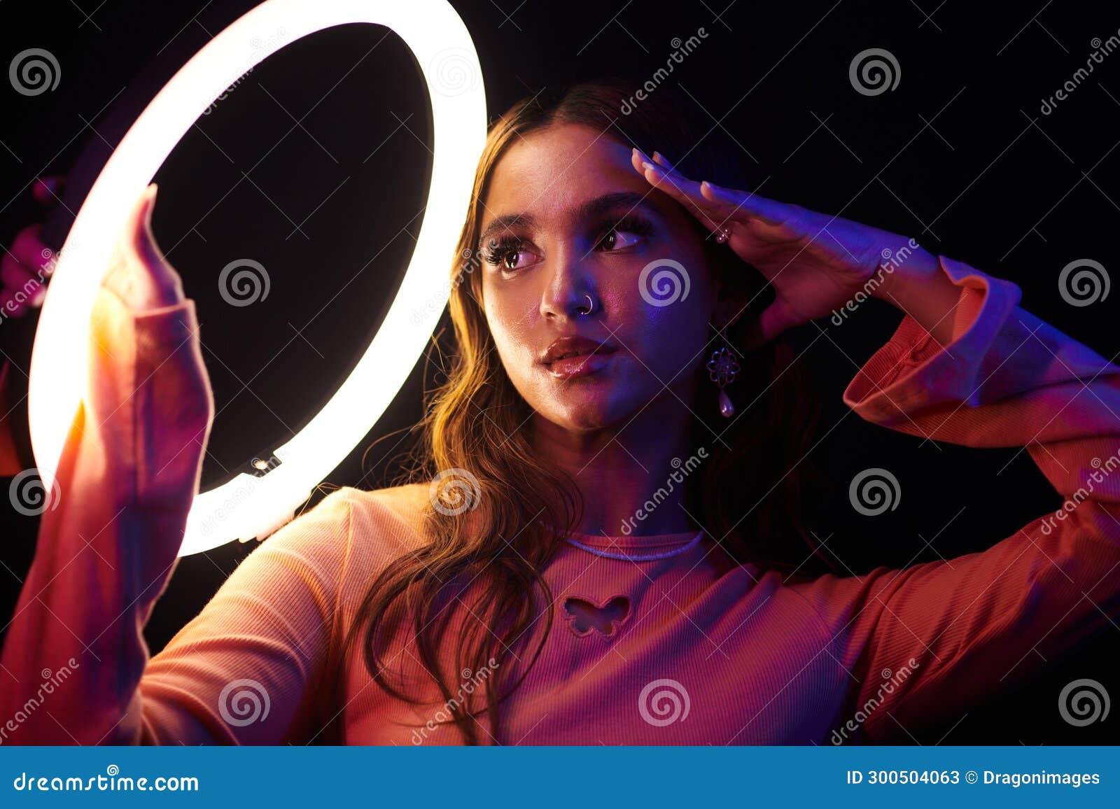 Woman Posing Under Ring Light Stock Image - Image of dark, party: 300504063